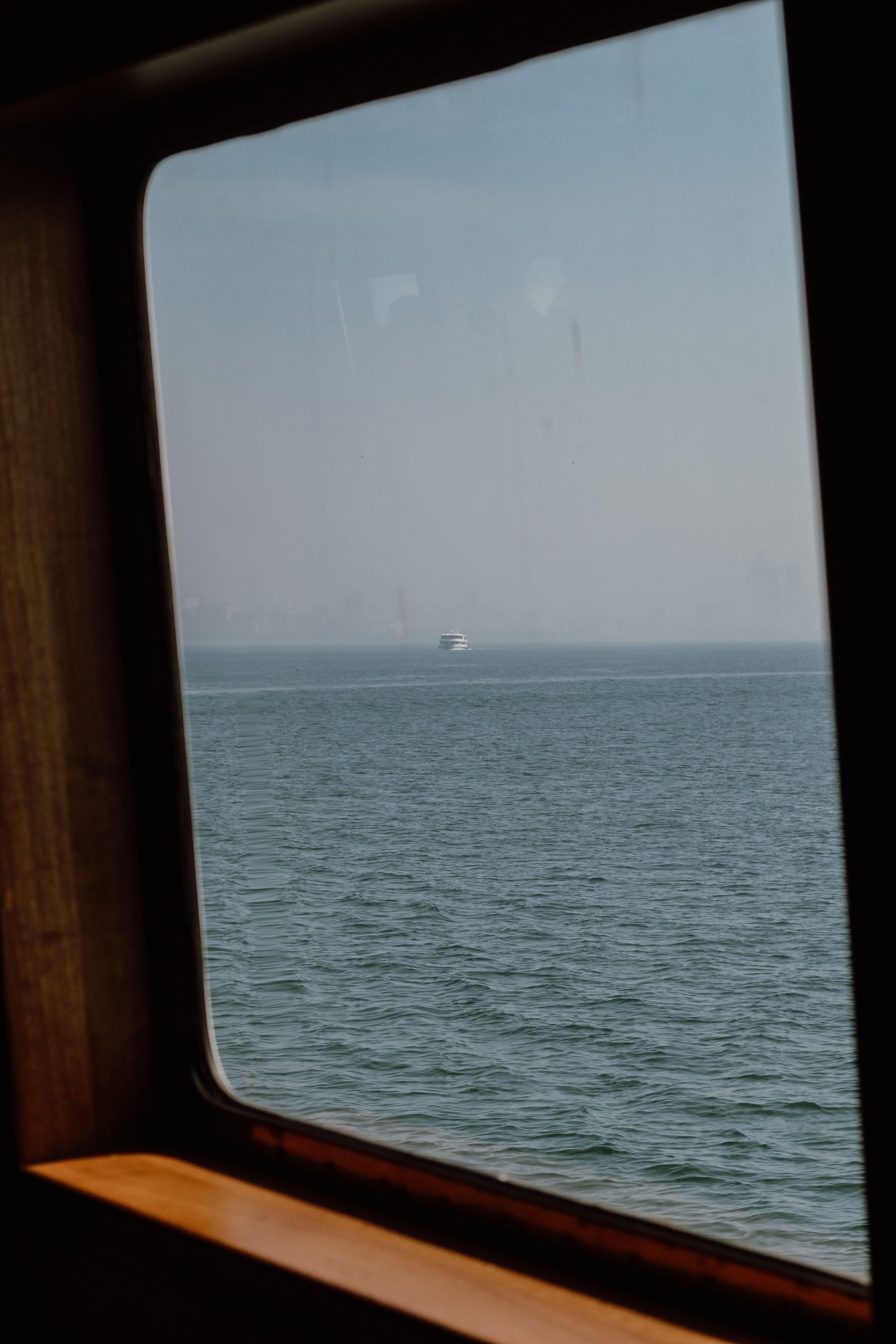 Sea behind Window · Free Stock Photo