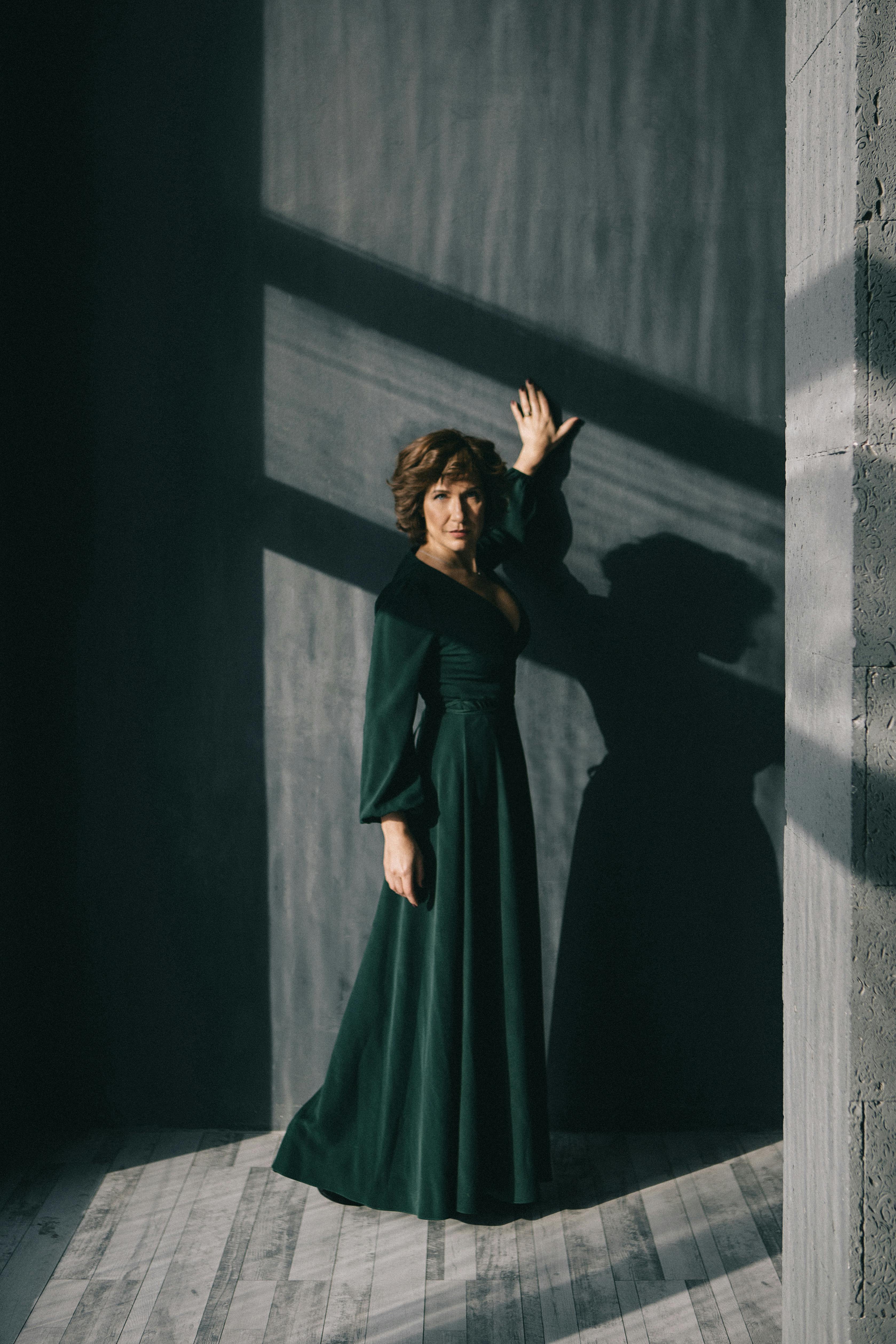 Woman in Dress Standing among Plants · Free Stock Photo