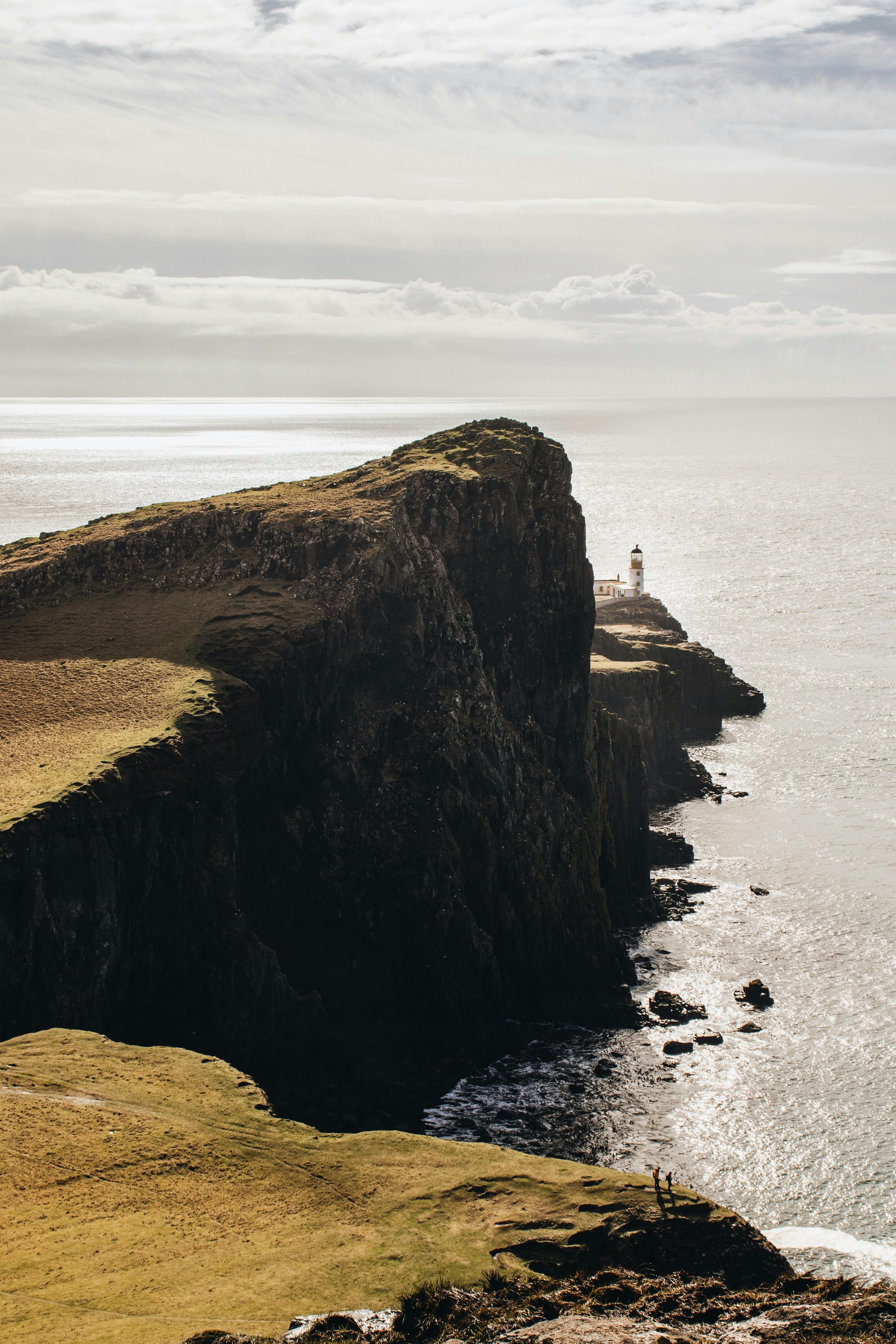 Cliff on Sea Shore · Free Stock Photo