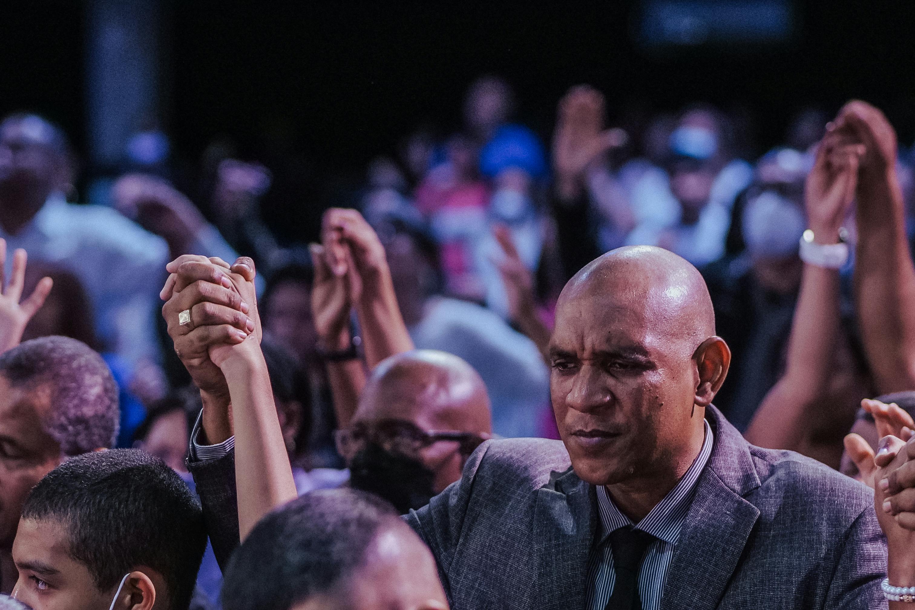 Praying People during Mass · Free Stock Photo