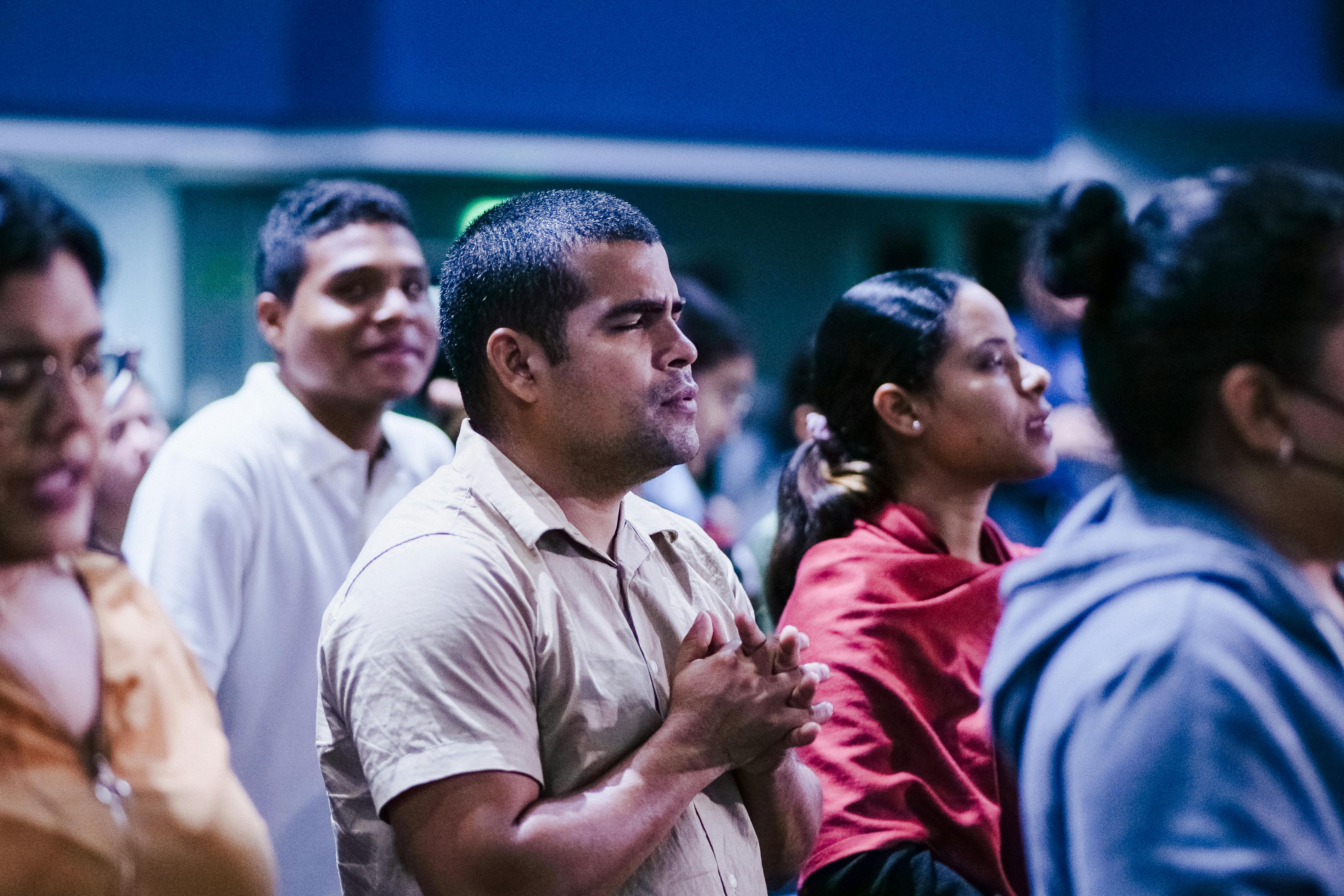 People Praying in a Church · Free Stock Photo