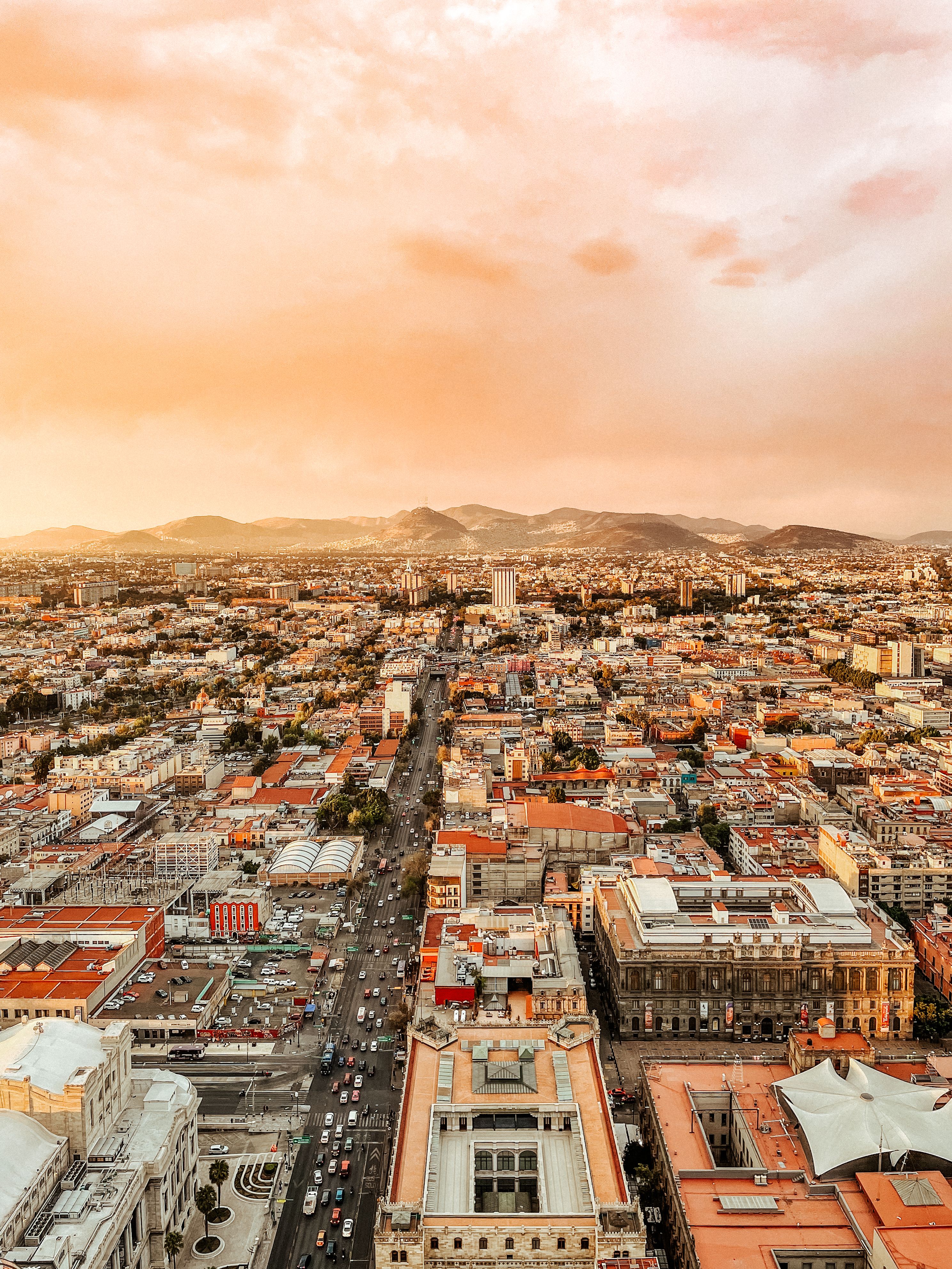 Clouds over Town at Sunset · Free Stock Photo