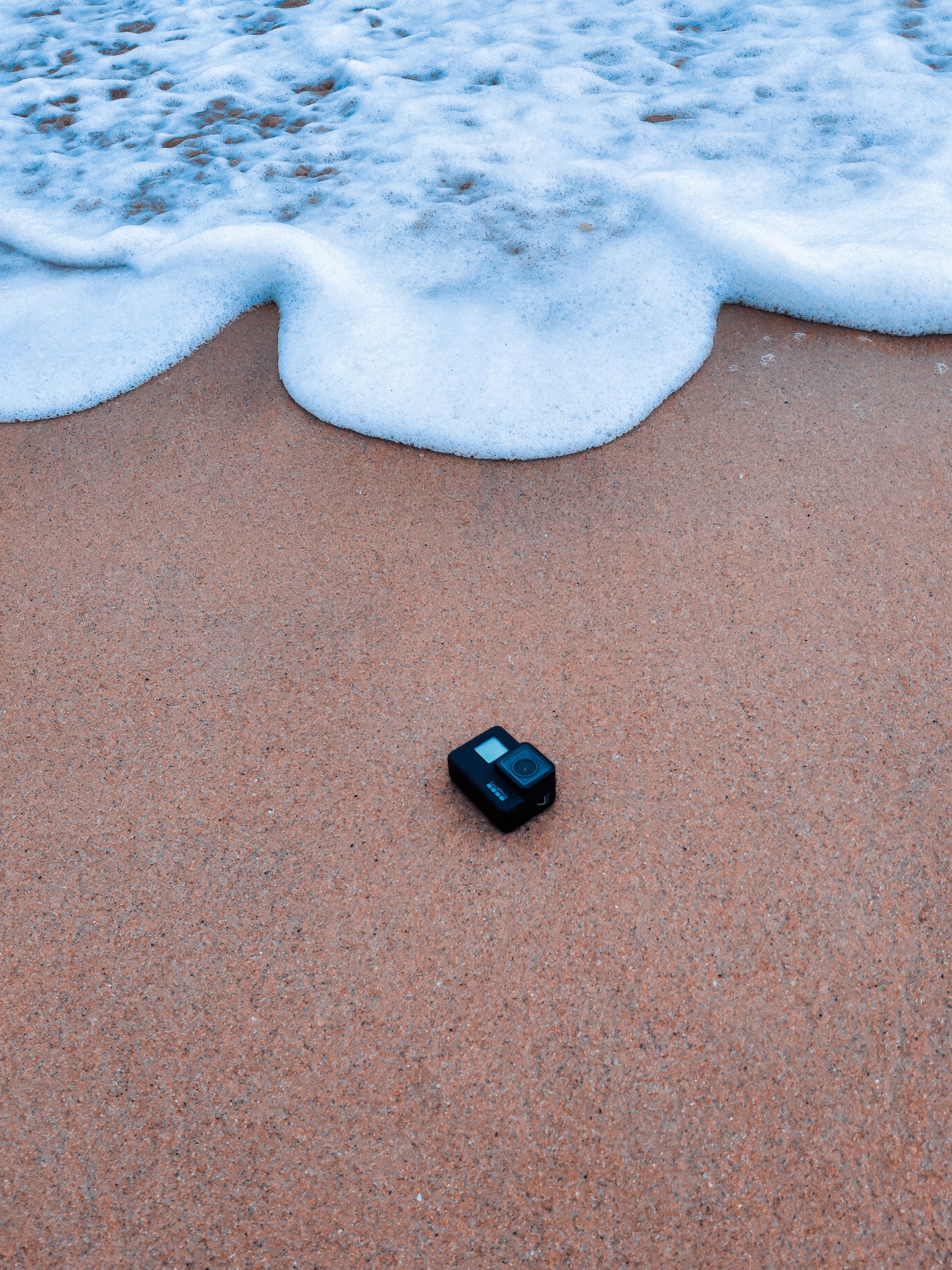 A Camera on a Beach · Free Stock Photo