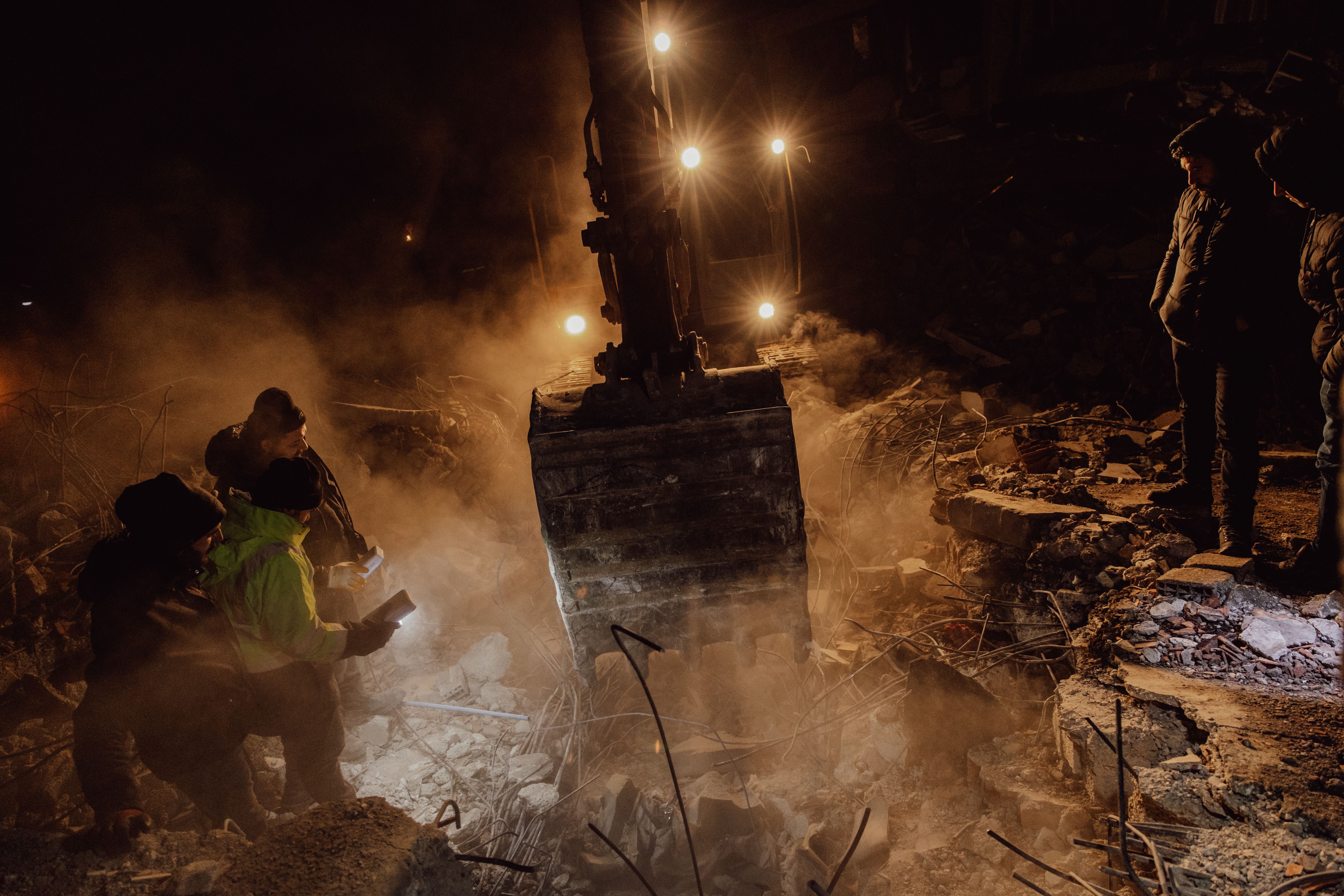 People Working among the Ruins of Demolished Buildings · Free Stock Photo