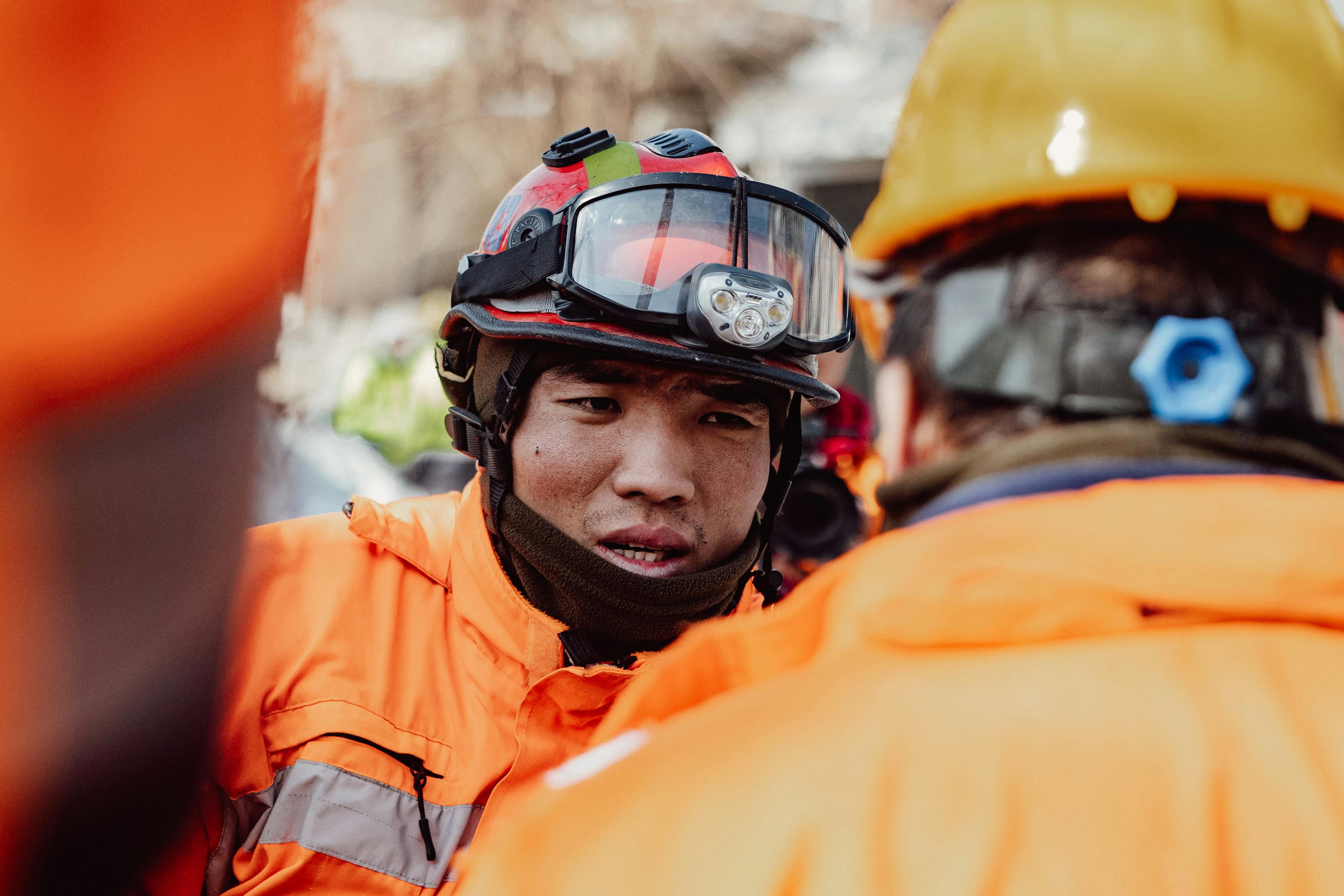 Rescuer with Safety Helmet and Goggles · Free Stock Photo