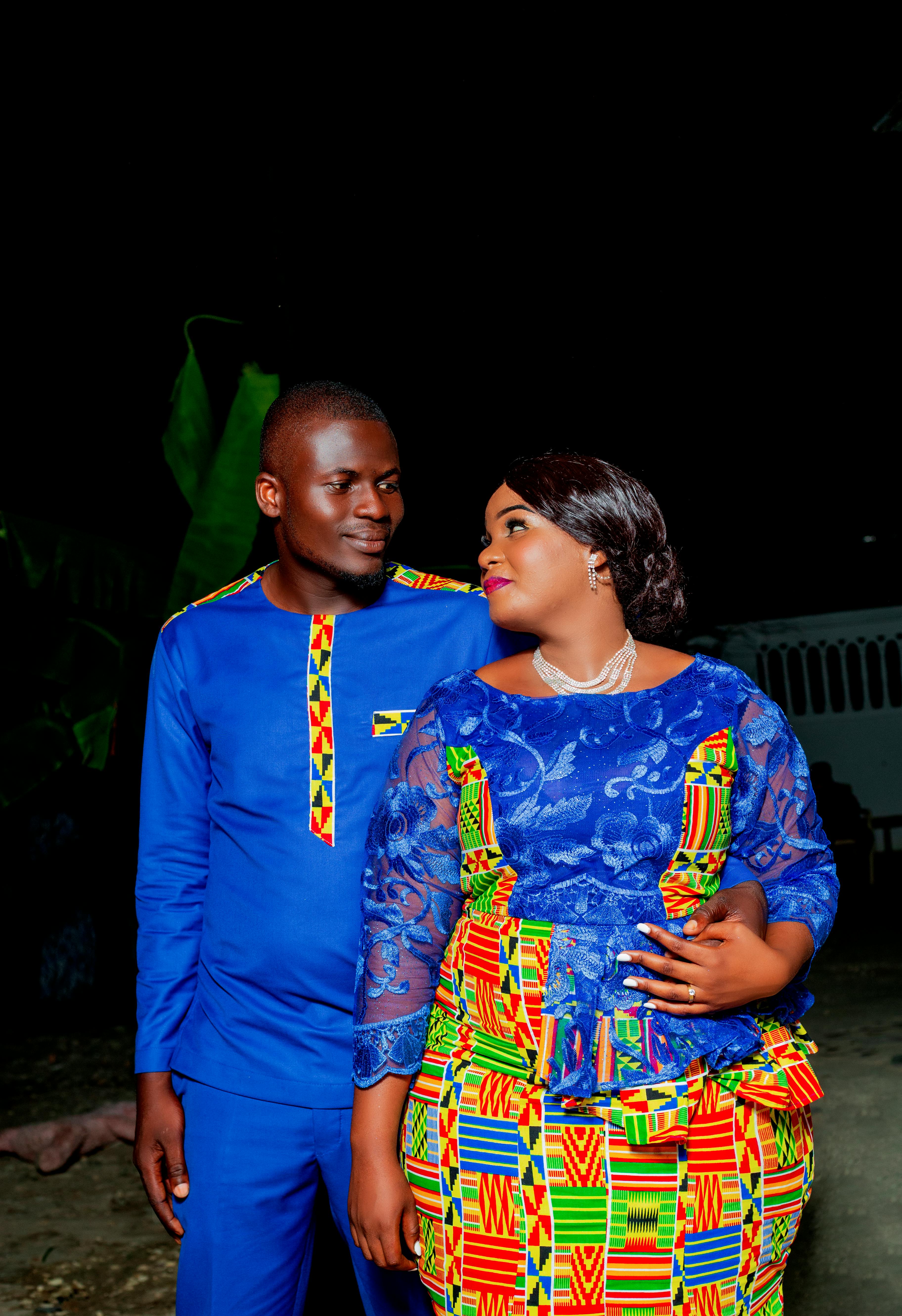 Young Couple in Traditional Clothing Standing Outside in the Dark ...