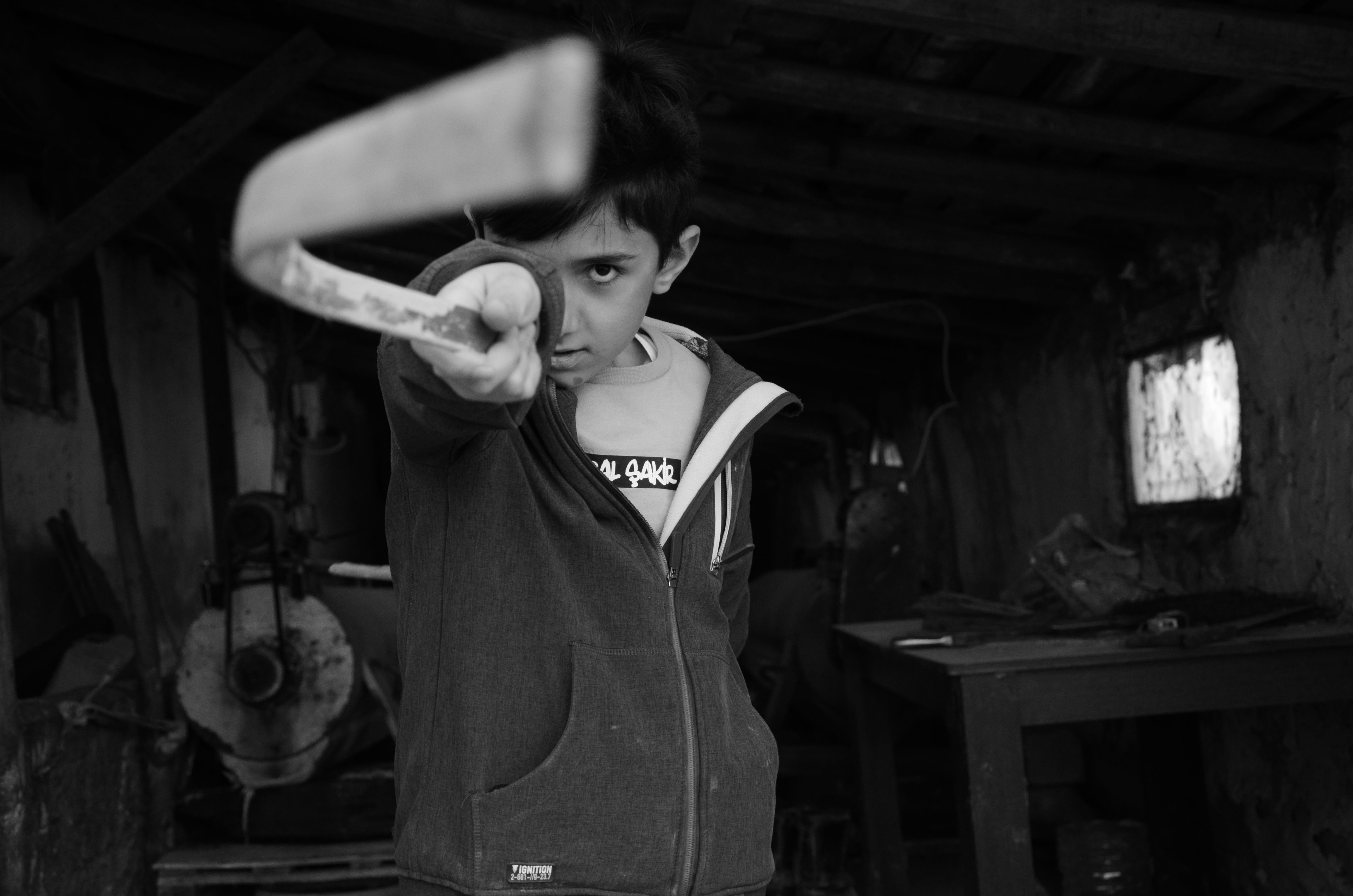 Boy Face behind Window in Black and White · Free Stock Photo