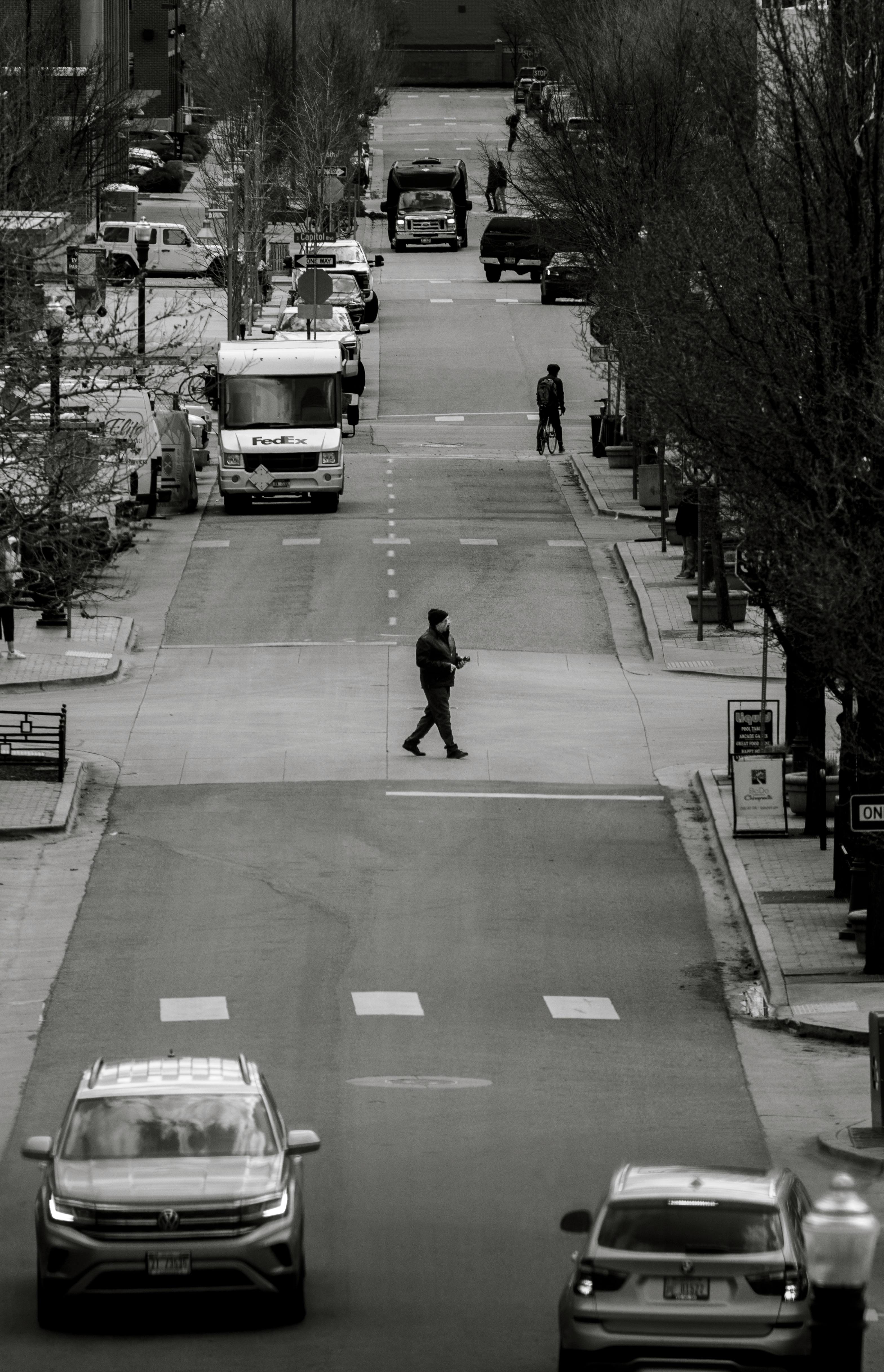 Passerby Walking Through an Intersection · Free Stock Photo