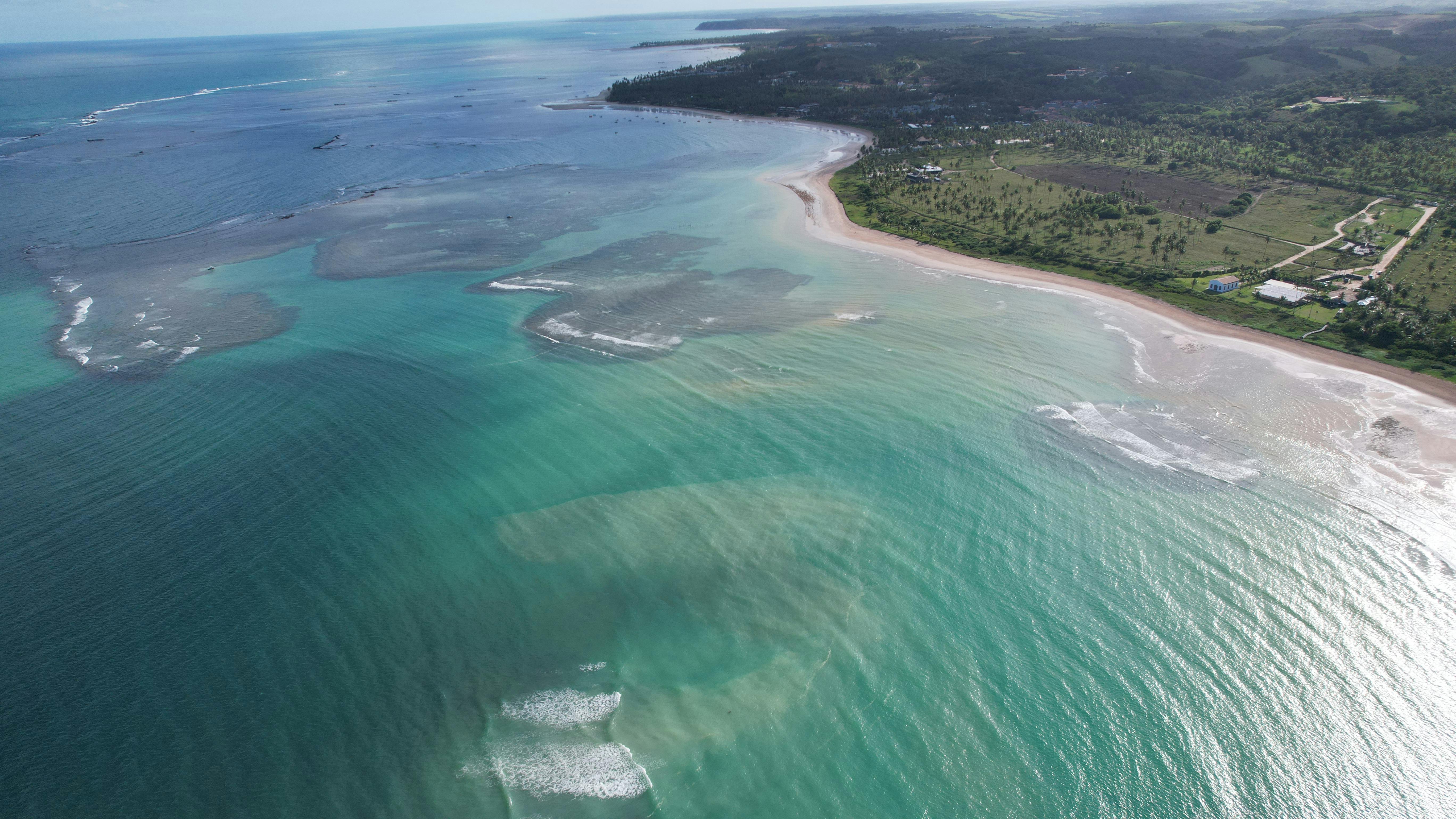 Aerial View of a Coastal Landscape in Summer · Free Stock Photo