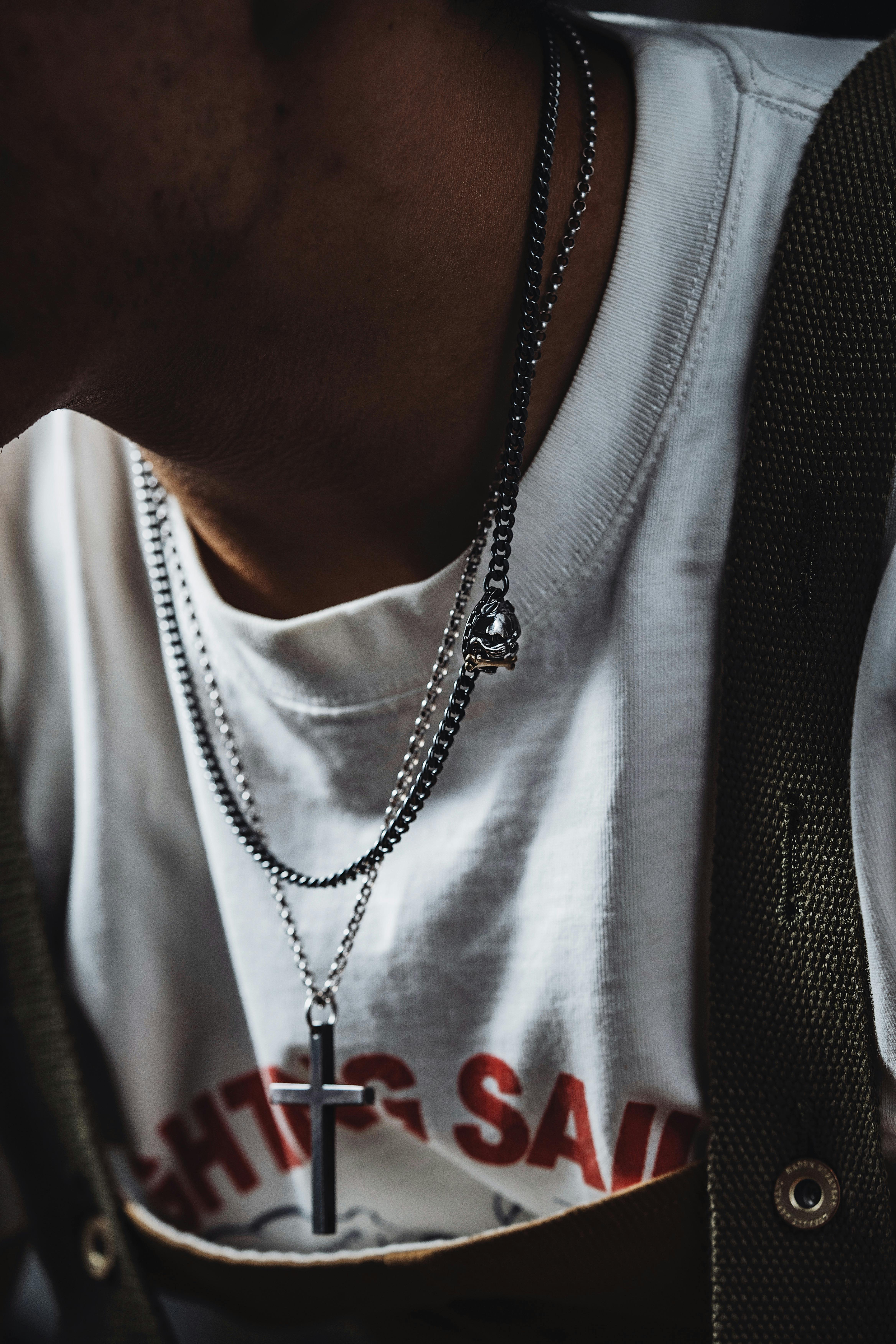 A Cross on Chain on Mans Neck · Free Stock Photo