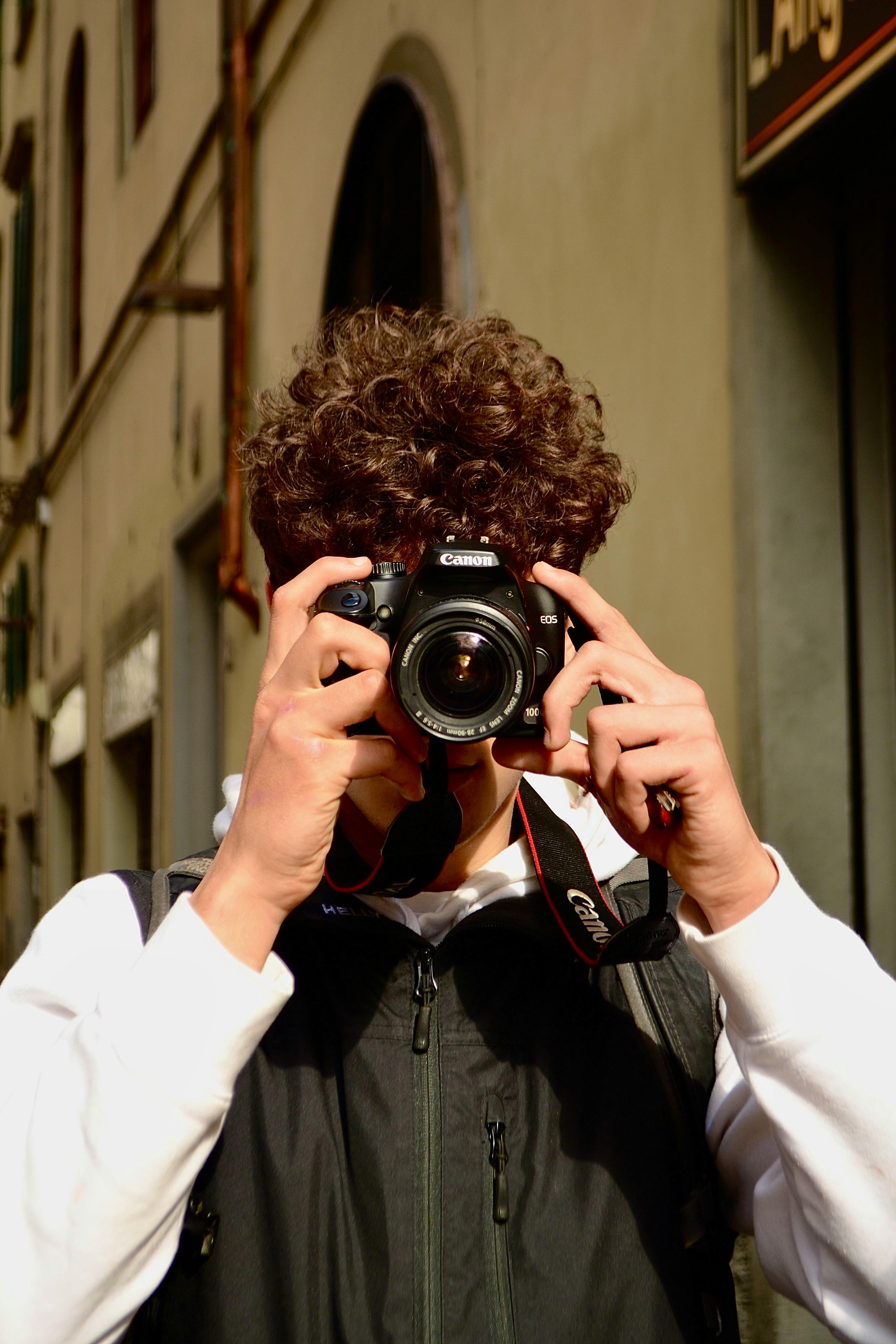 Man with Camera in City · Free Stock Photo
