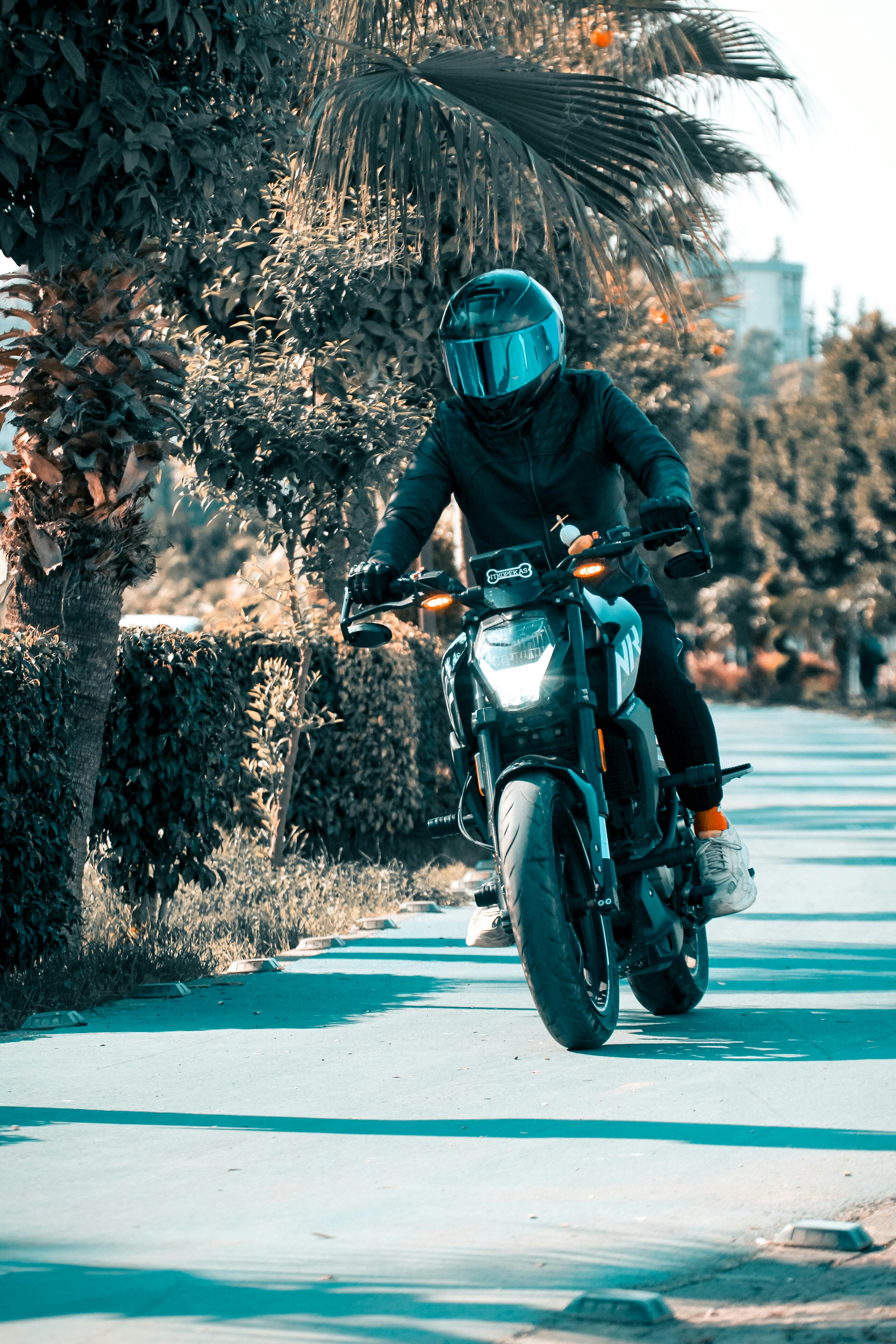 Two Men Riding Motorcycle · Free Stock Photo