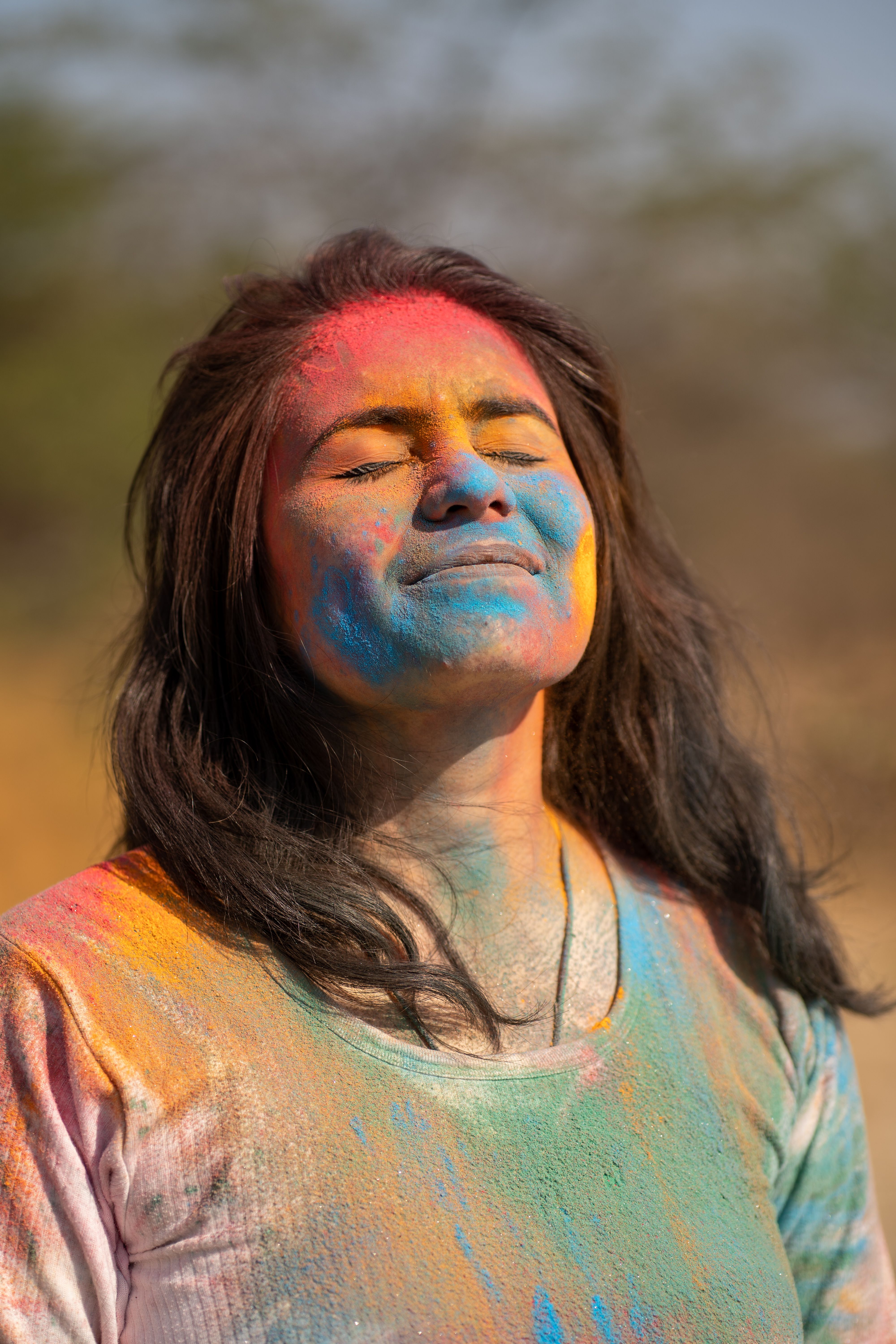 Woman with Colorful Powder on her Face · Free Stock Photo