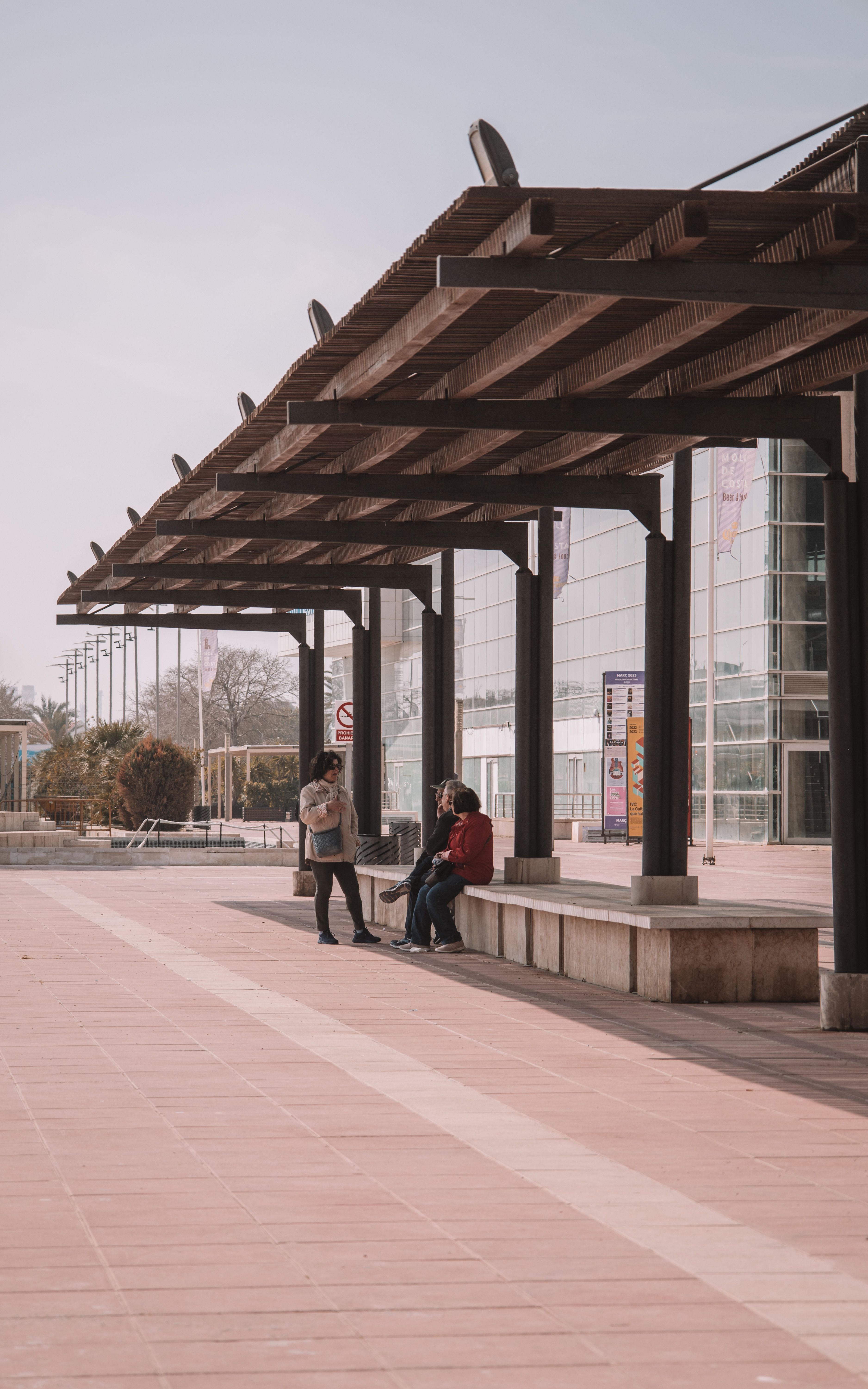 People Waiting at Bus Stop · Free Stock Photo