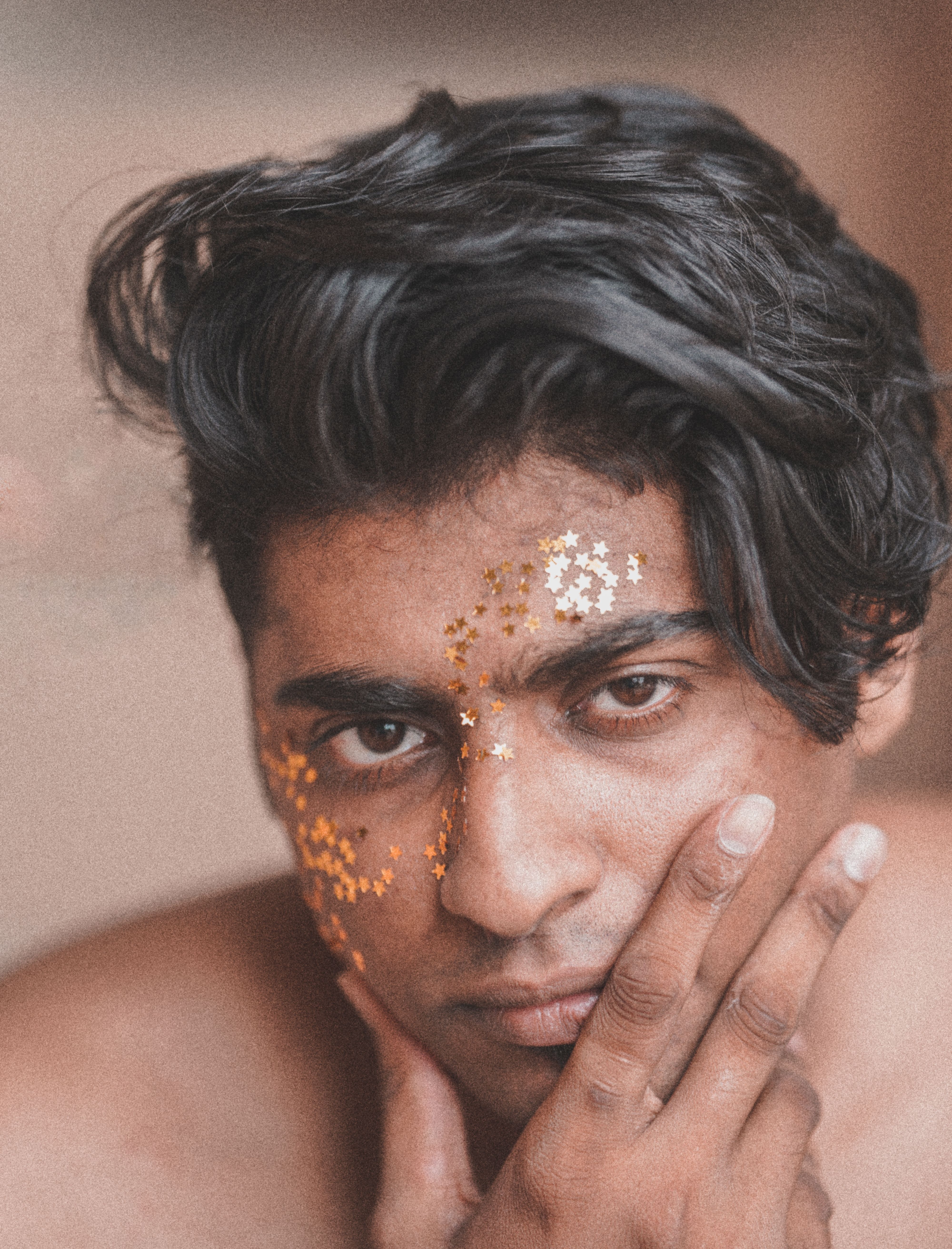 Young Man with Star Shaped Stickers on His Face · Free Stock Photo