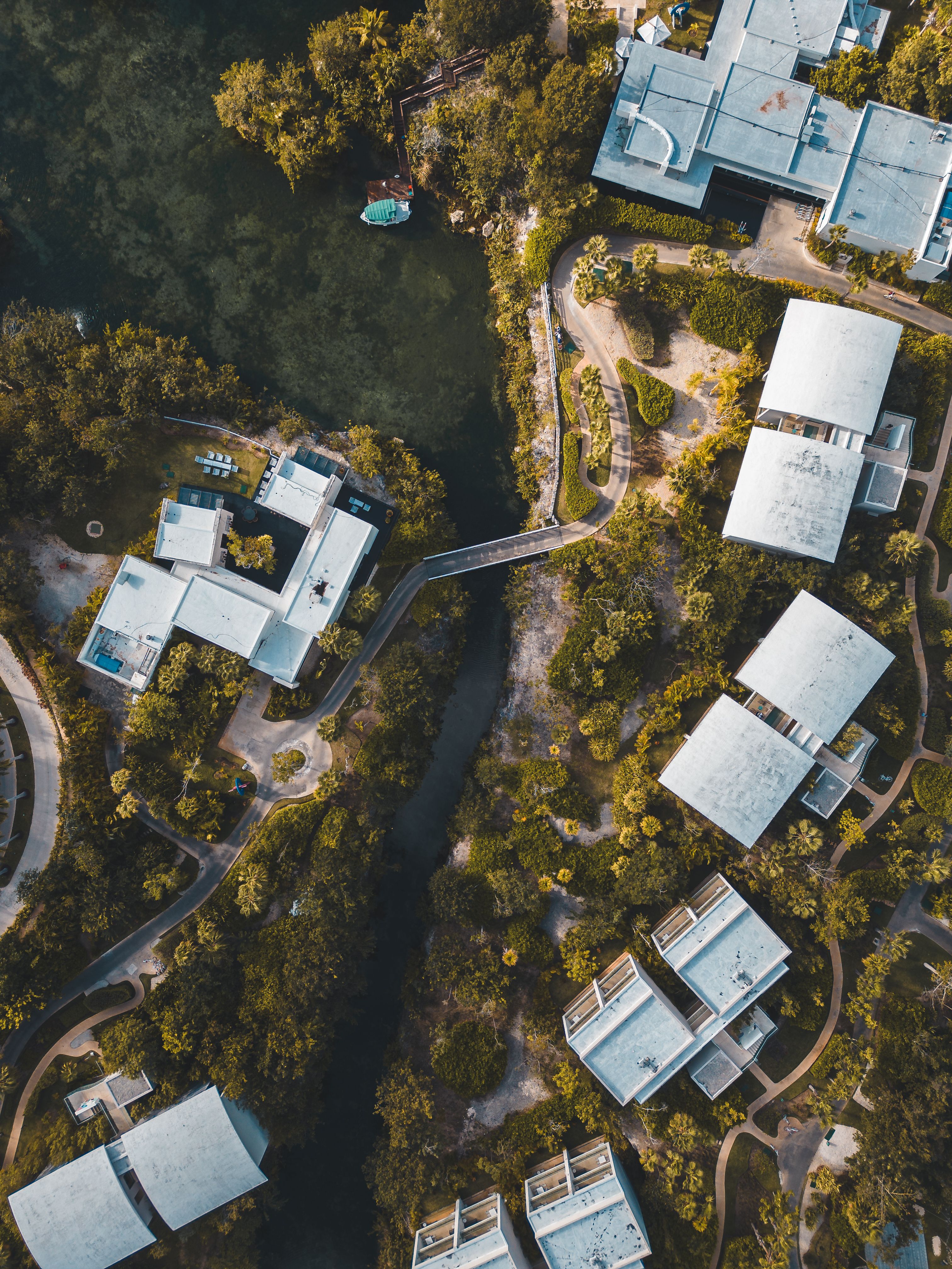 Aerial Photography of a Tourist Resort on the Riverbank · Free Stock Photo