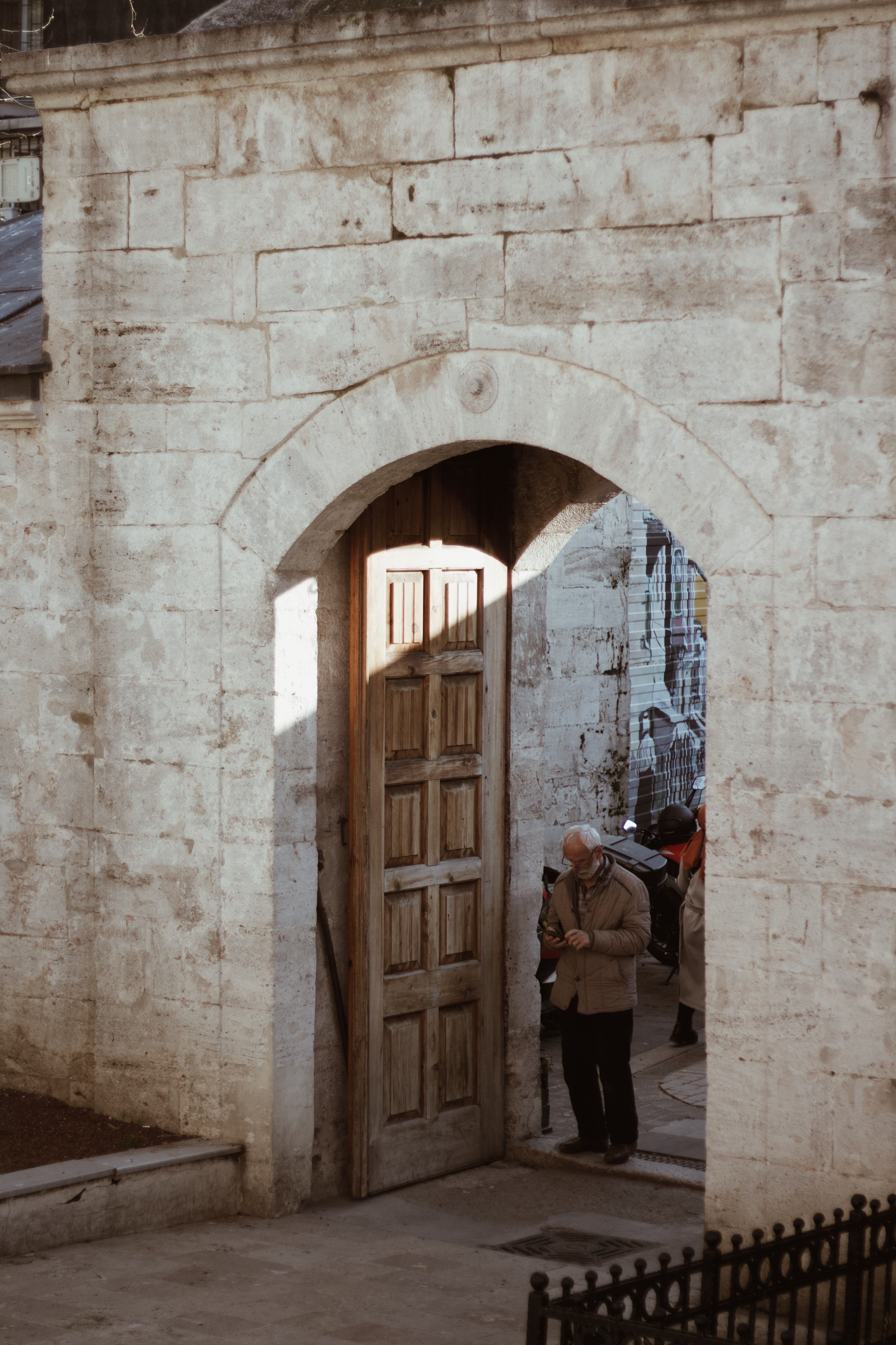 Elderly Man Standing in Gate · Free Stock Photo