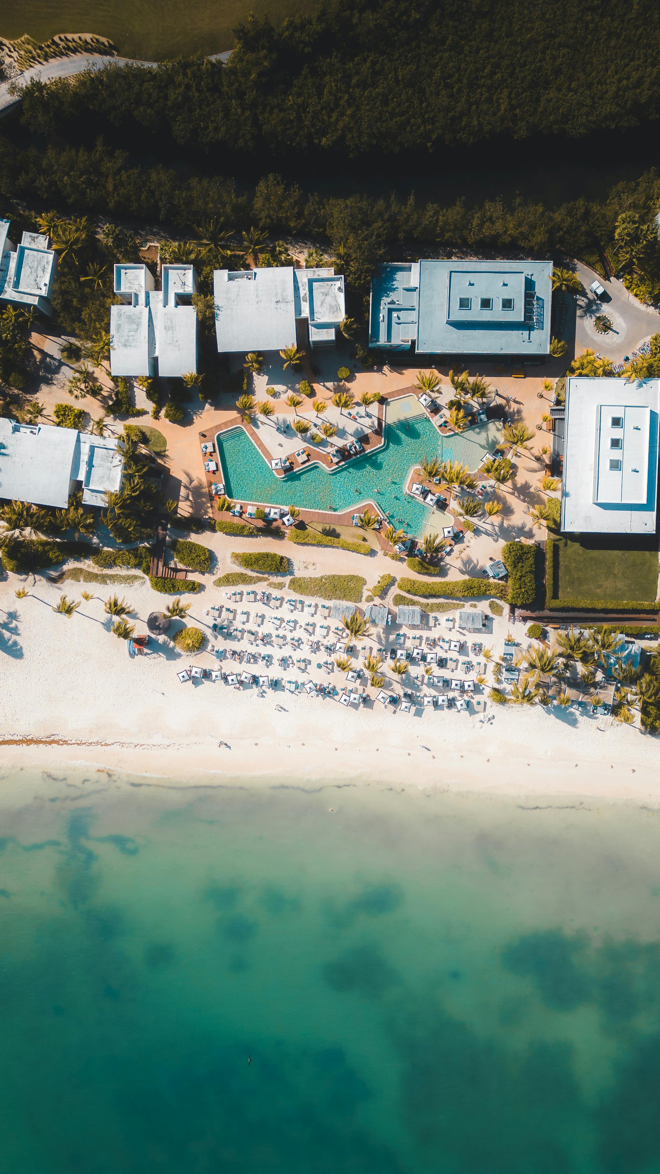 Birds Eye View of a Tourist Resort and a Beach · Free Stock Photo
