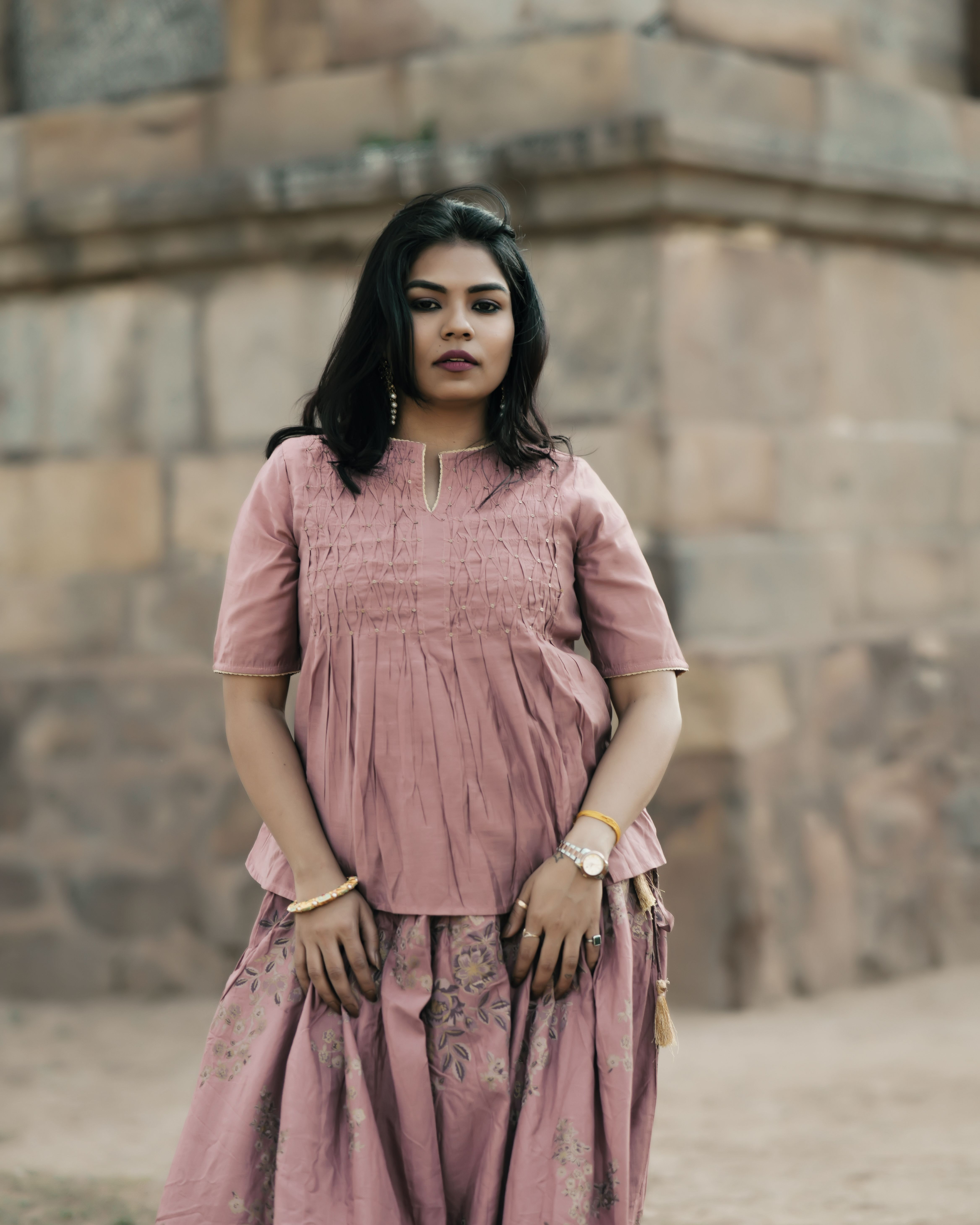 Woman Wearing Matching Pink Shirt and Skirt Set · Free Stock Photo