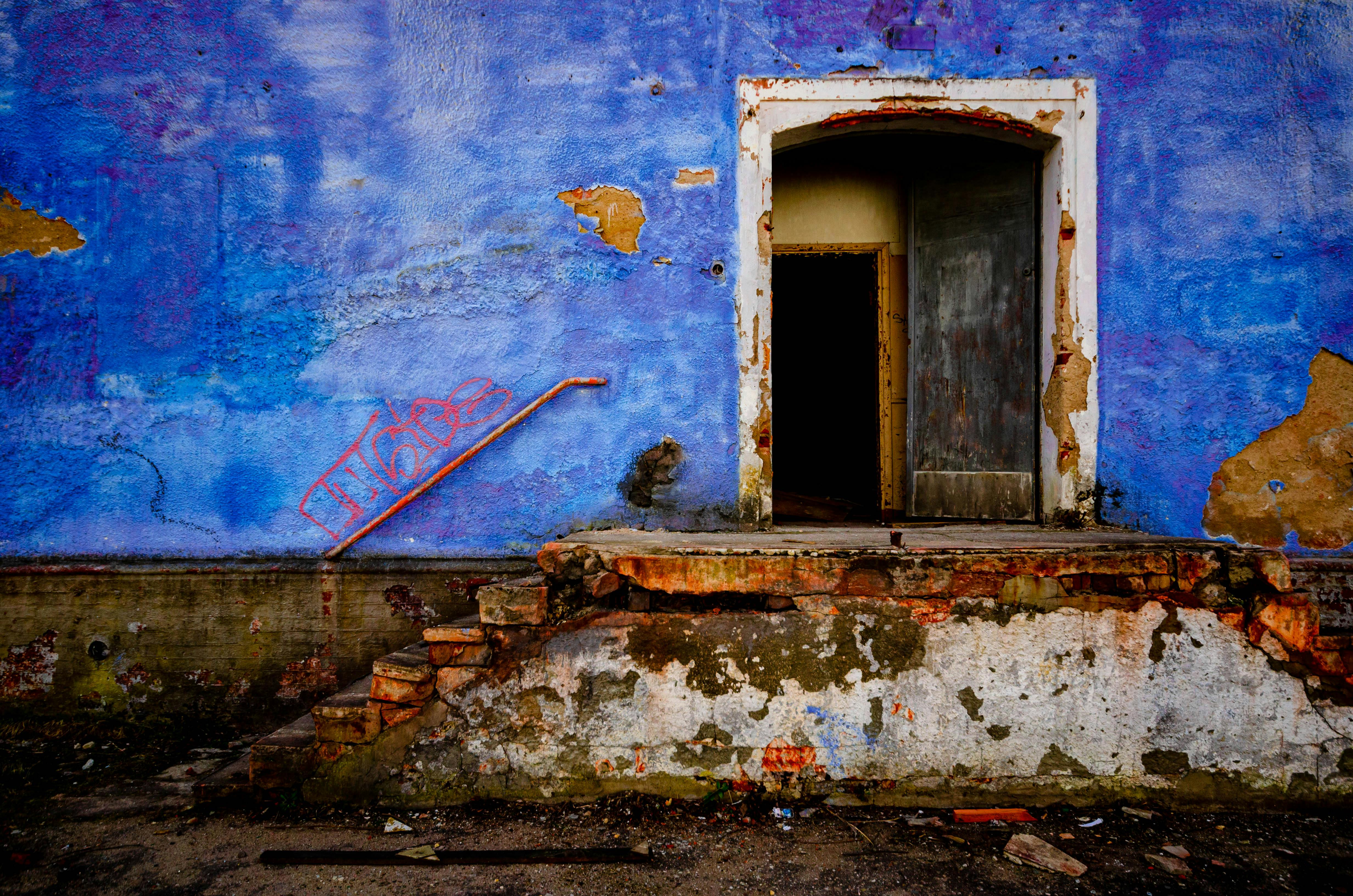 Crumbling Stairs in Front of the Entrance to an Abandoned Building ...