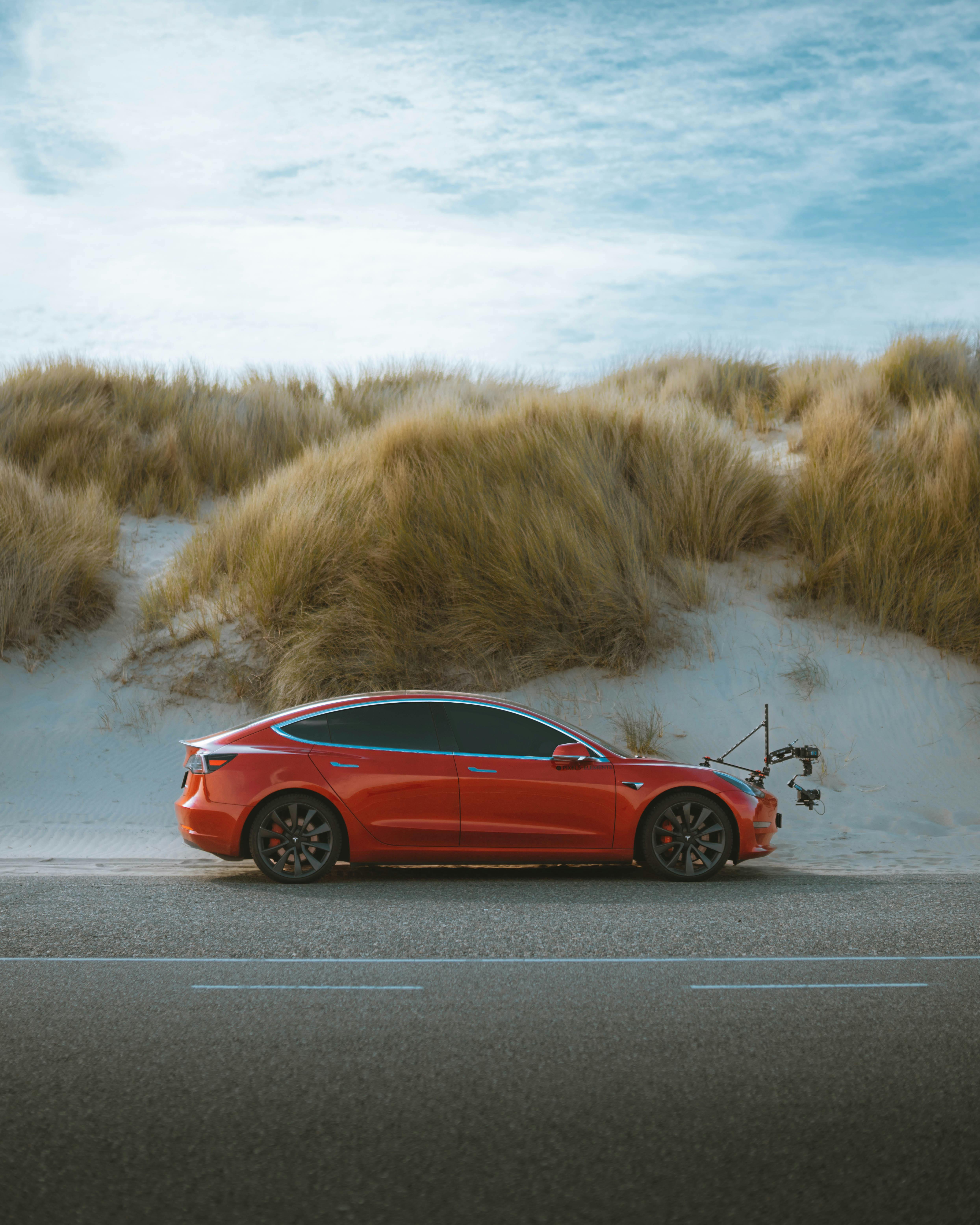 Red Car in the Desert Area · Free Stock Photo