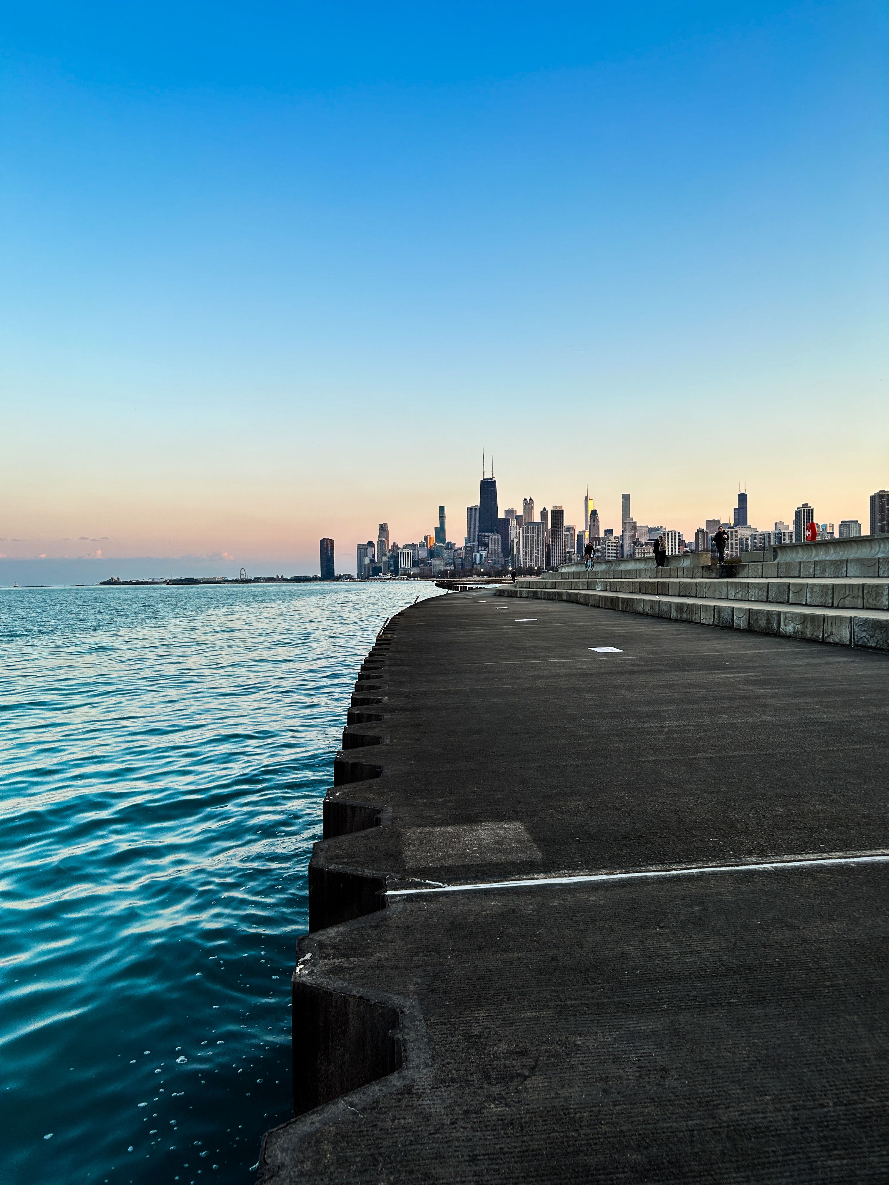 Promenade on Sea Shore with City behind · Free Stock Photo