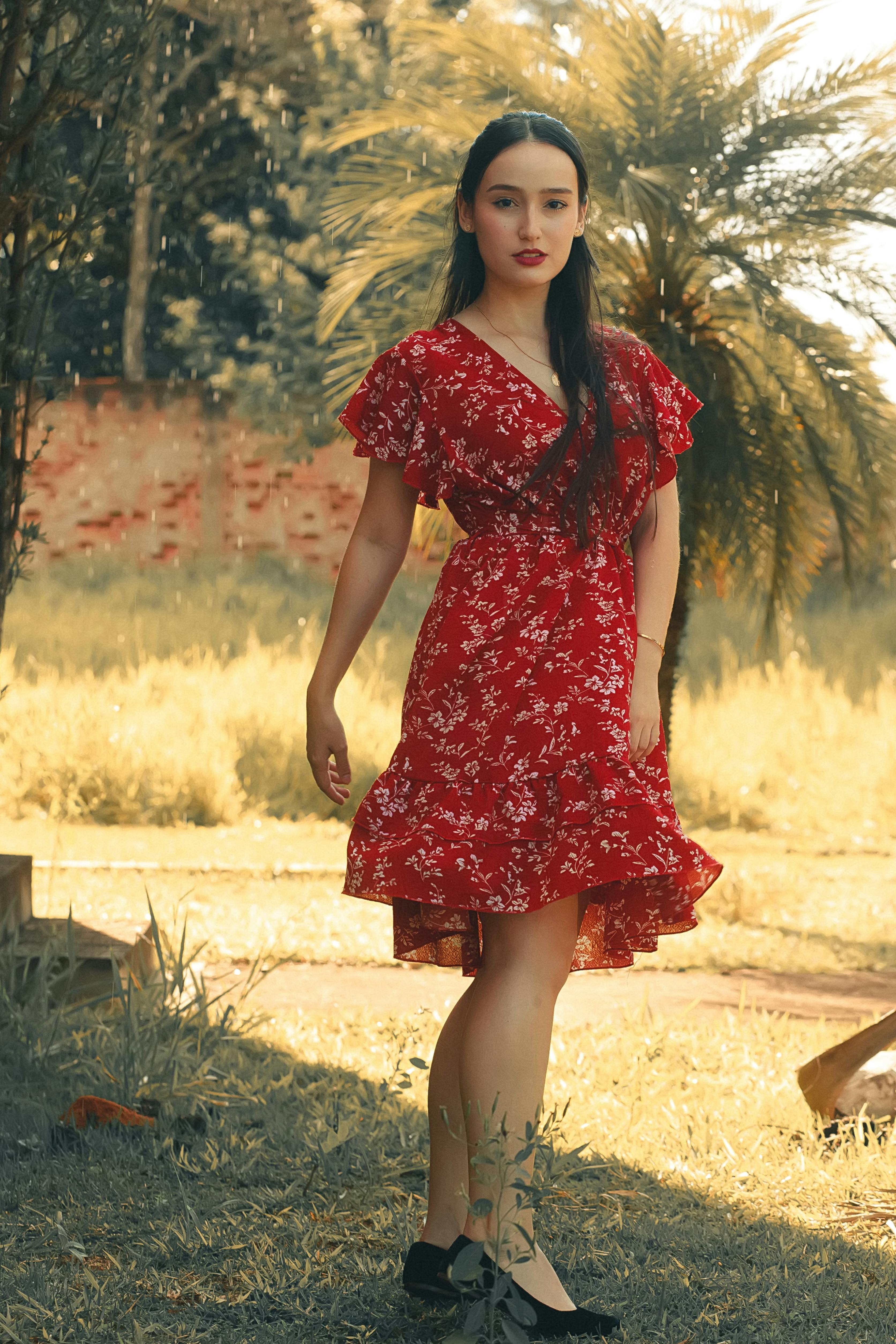 Woman in Dress Standing among Plants · Free Stock Photo