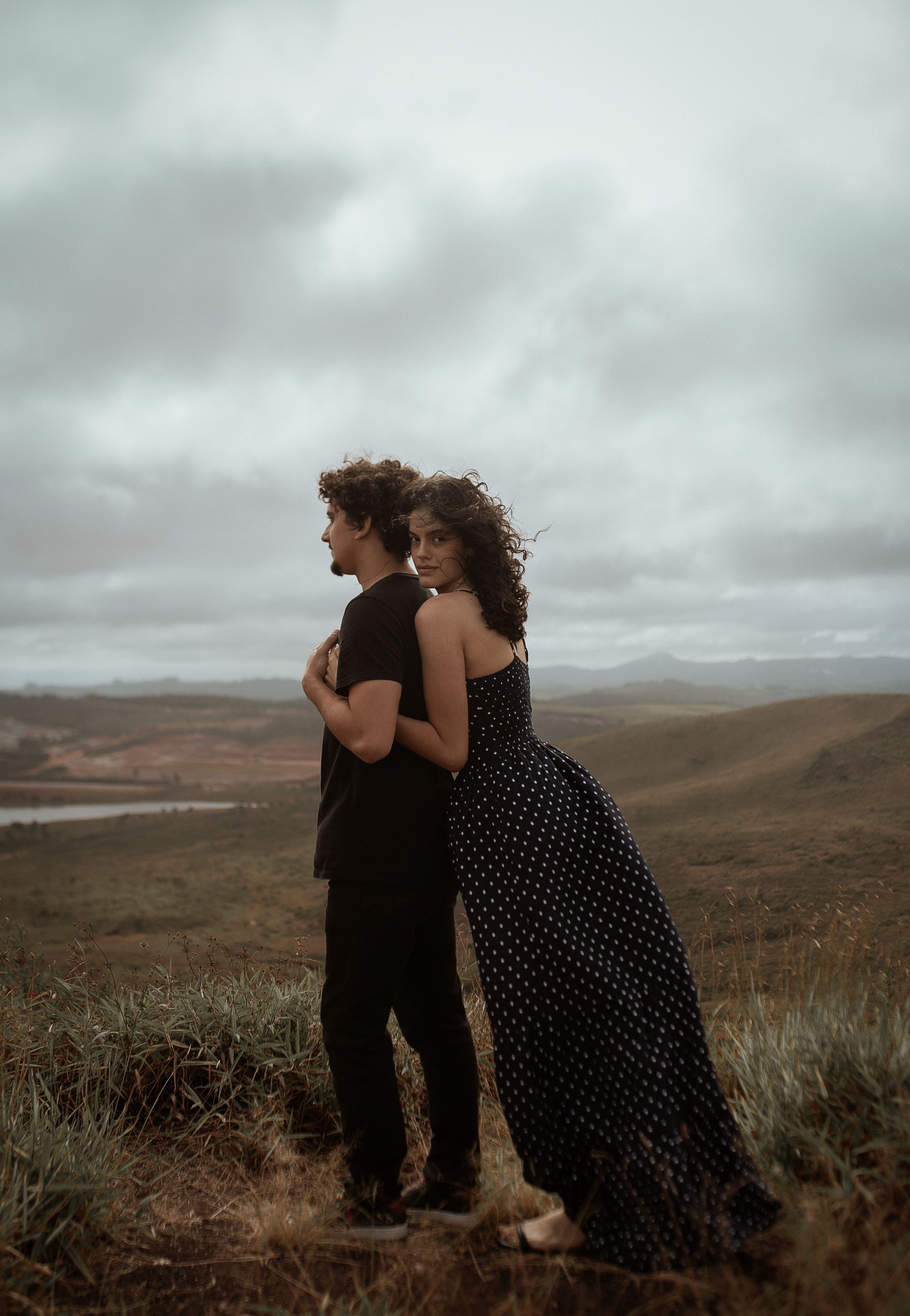Couple Hugging in Field in Wild Nature · Free Stock Photo