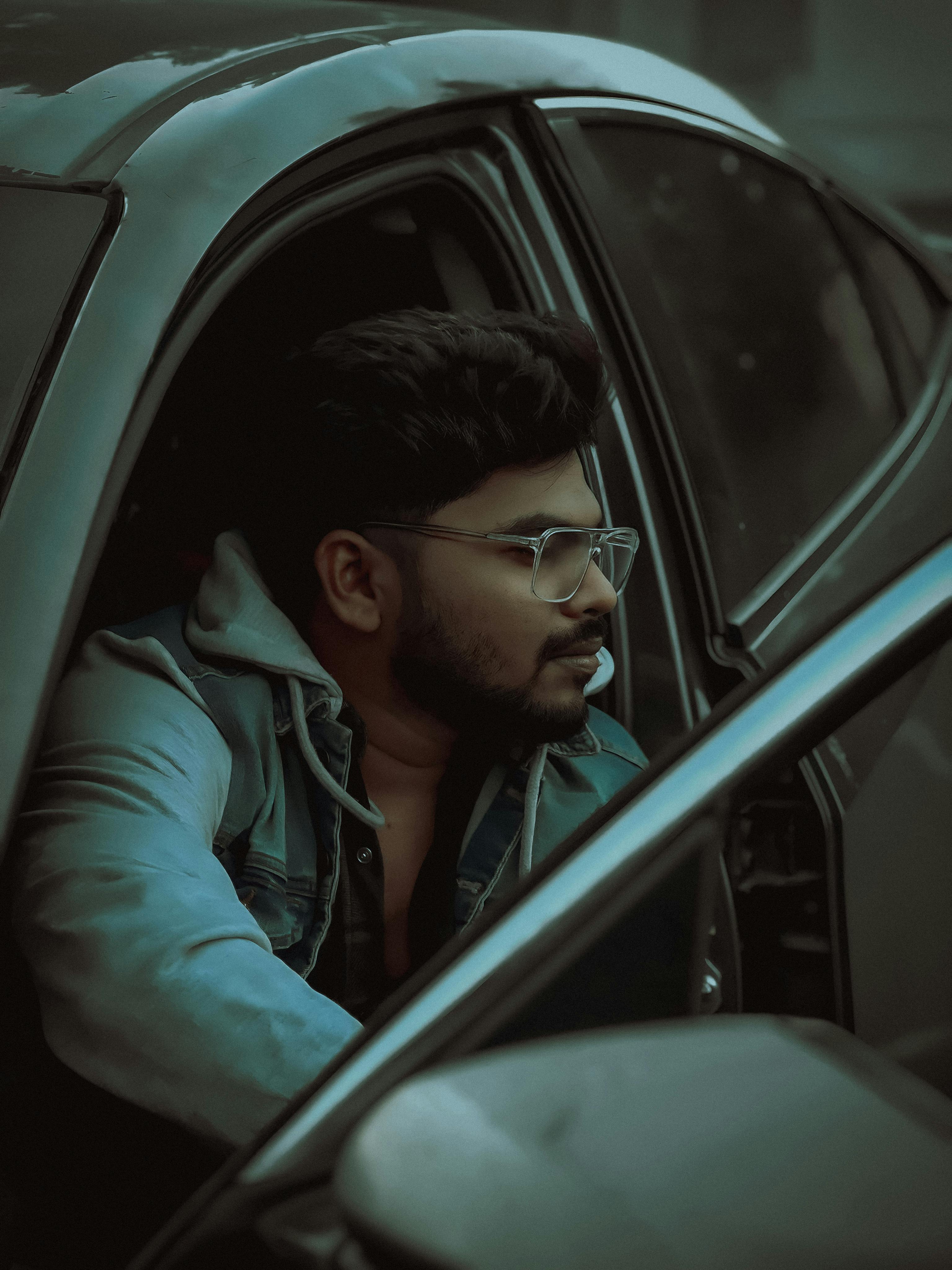 Photo of a Man Getting out of the Car · Free Stock Photo