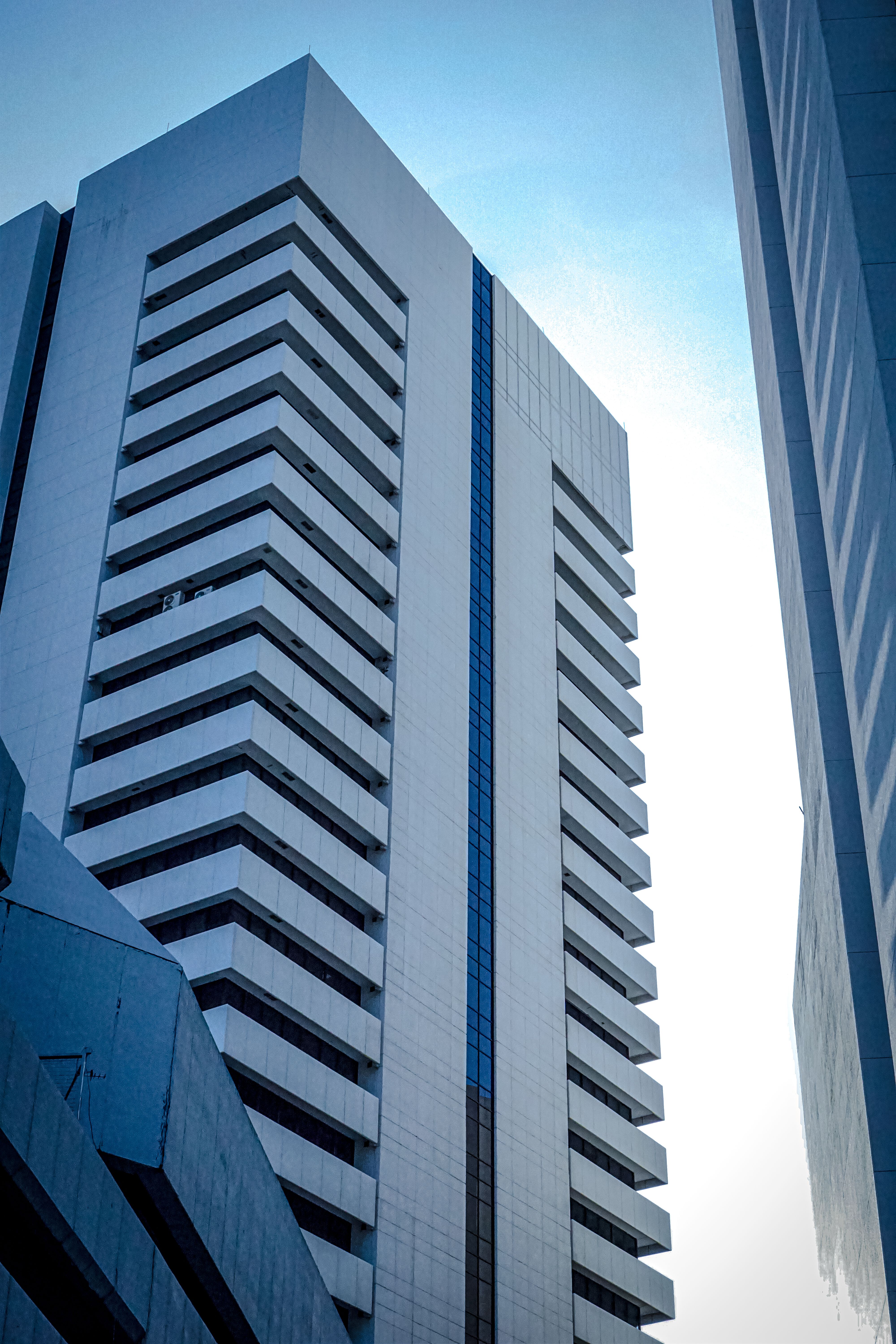 Modern Skyscraper against Blue Sky · Free Stock Photo