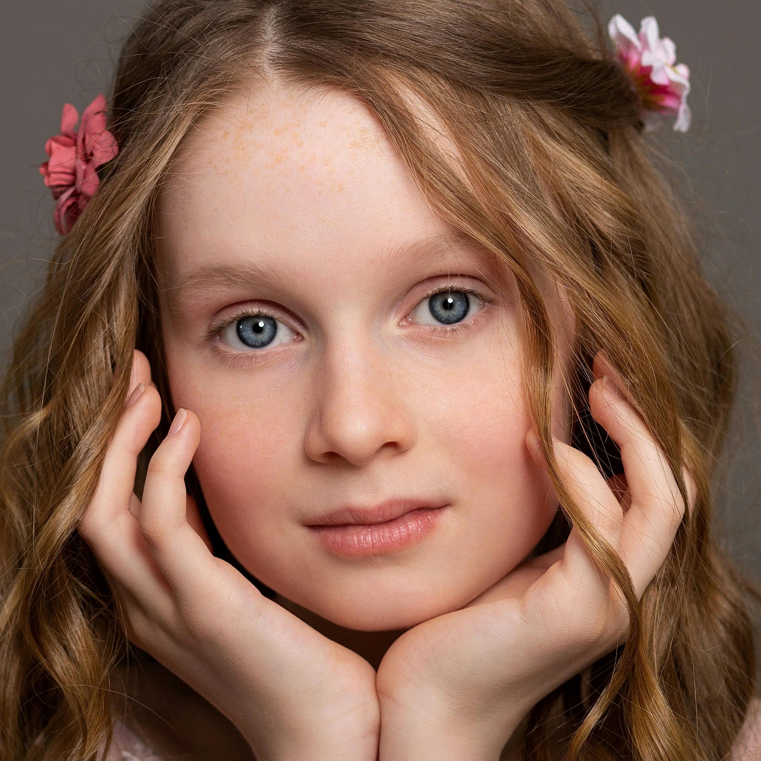 Girl with Flowers in her Hair · Free Stock Photo