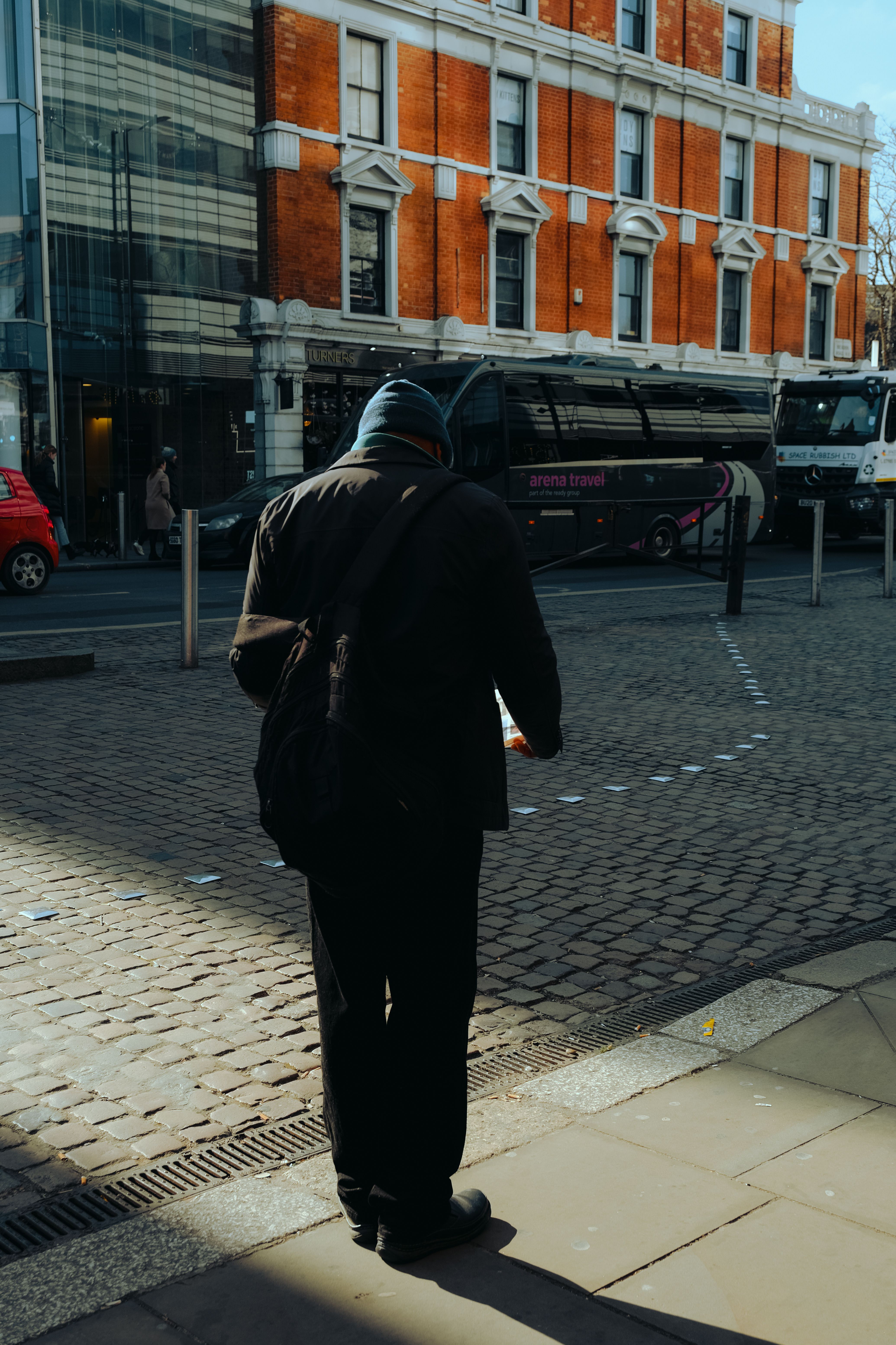 Back View of Man on Sidewalk · Free Stock Photo