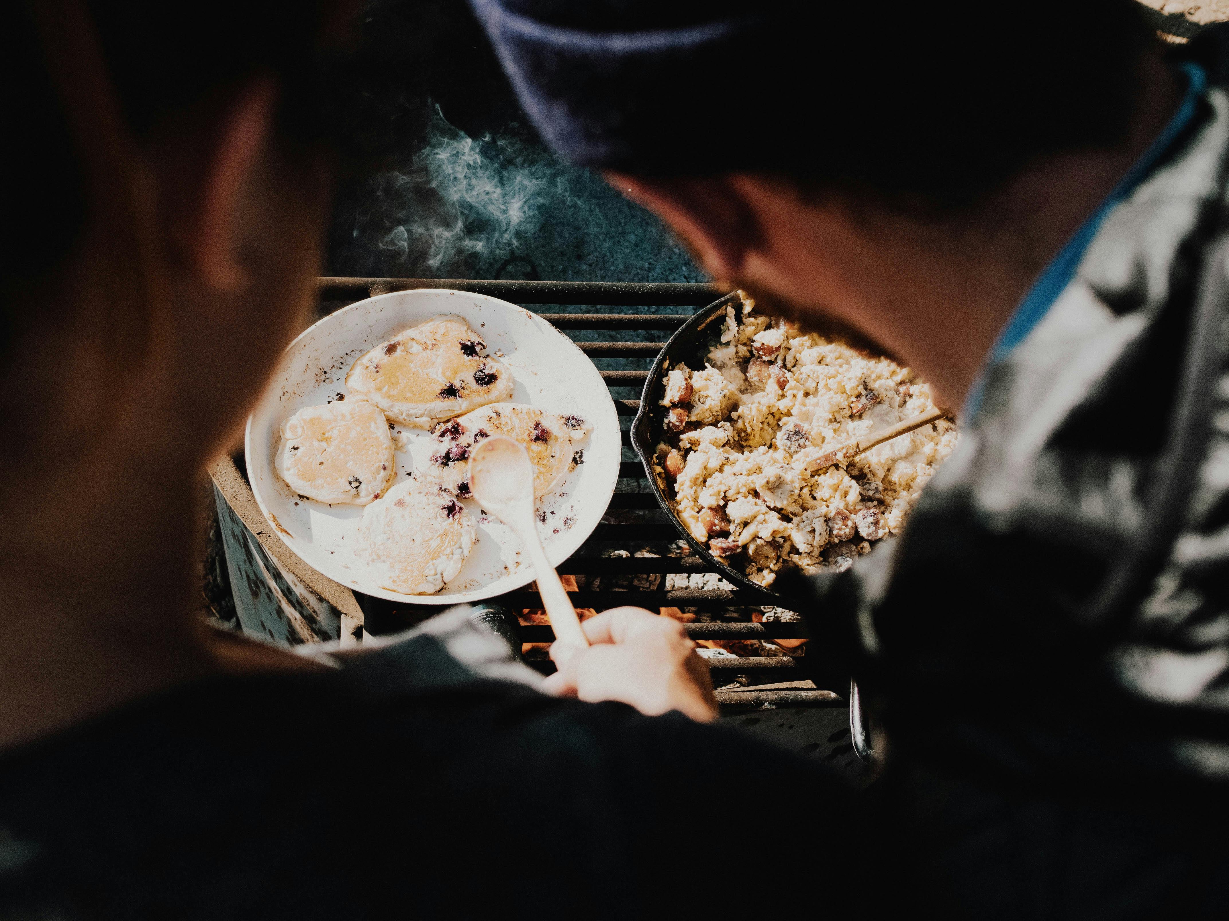 Couple Grilling · Free Stock Photo