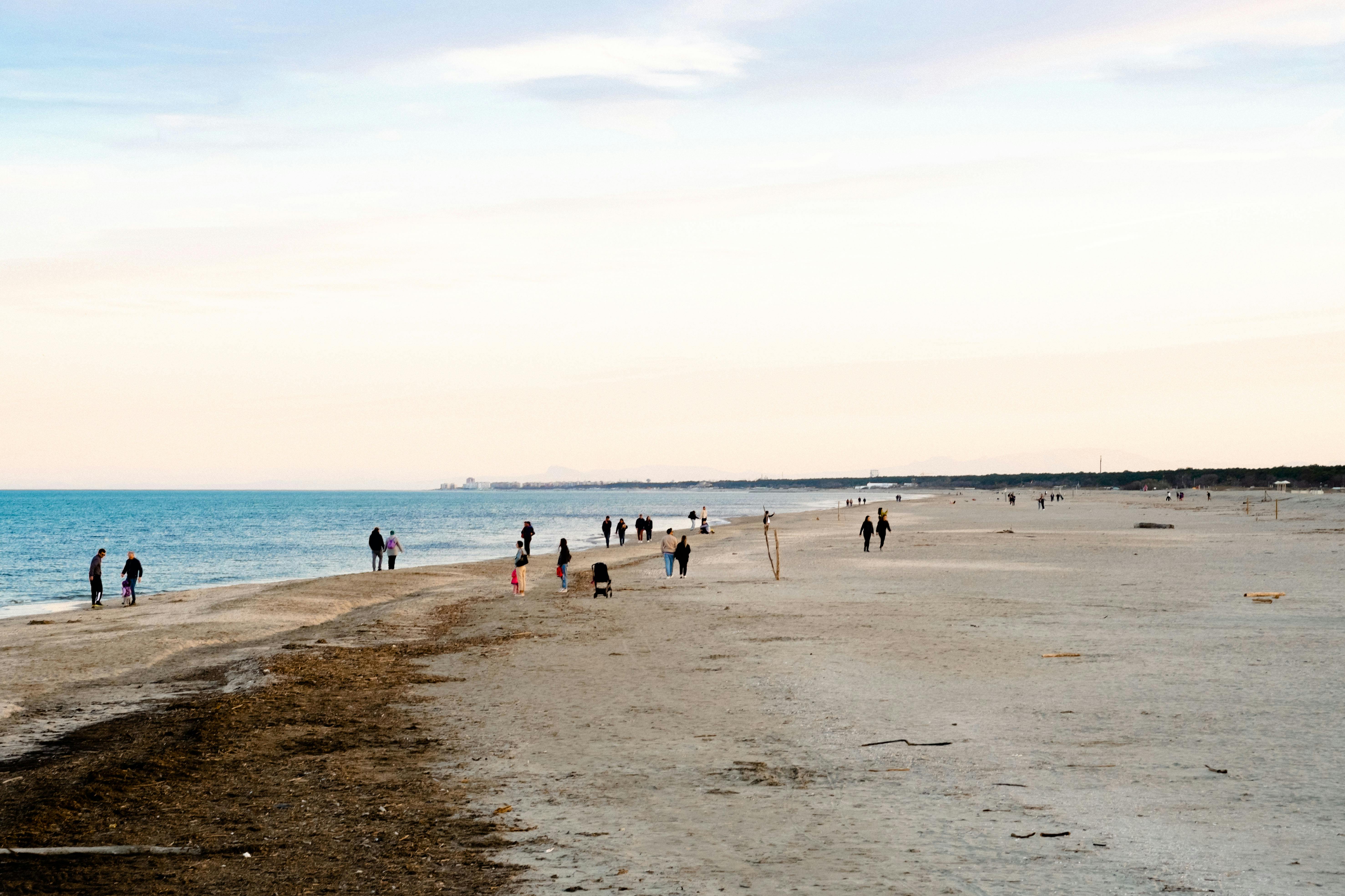 Woman with Cane Relaxing on Beach · Free Stock Photo