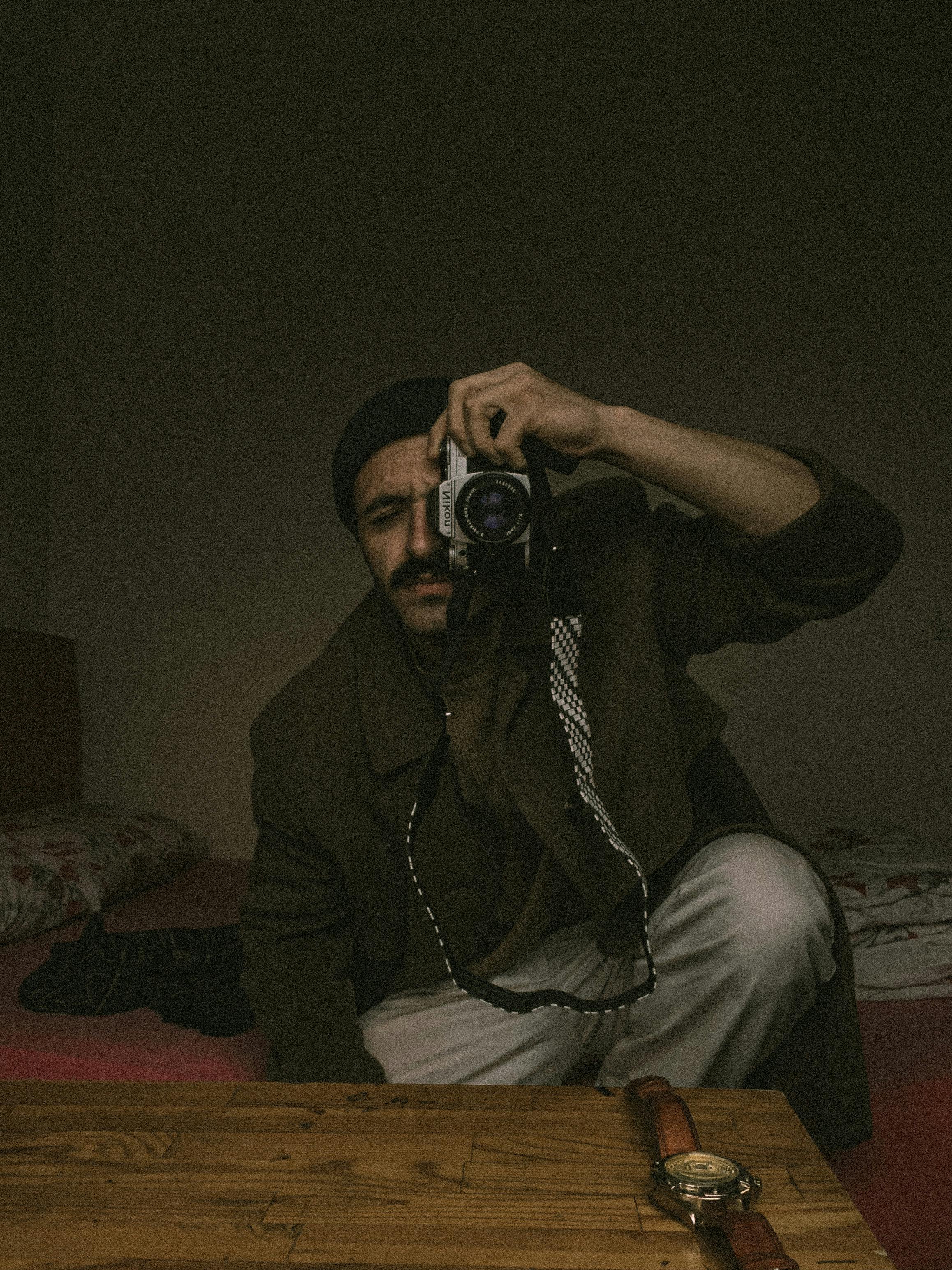 Man Holding Vintage Camera · Free Stock Photo