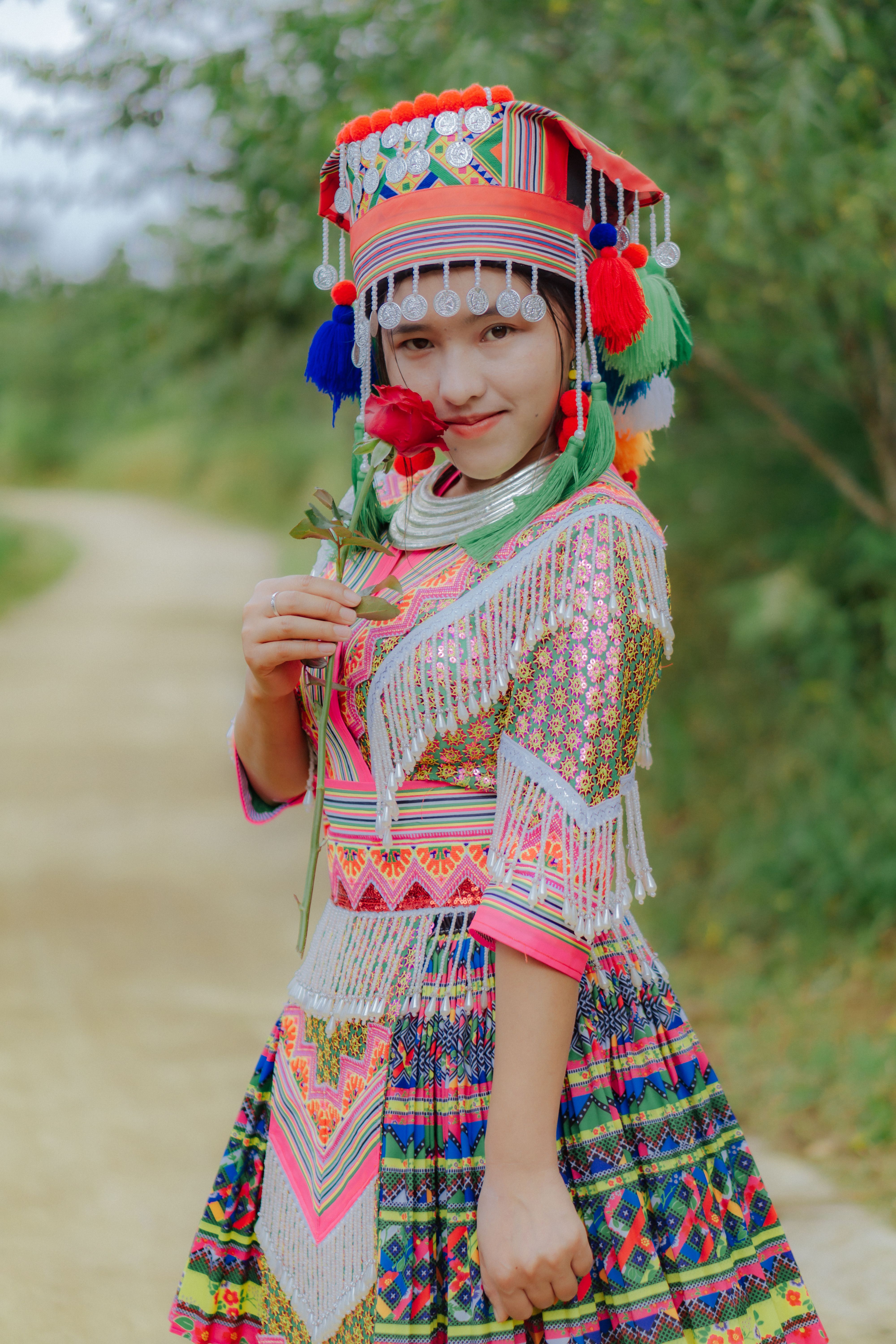 Woman Standing on Path Wearing Traditional Clothing · Free Stock Photo