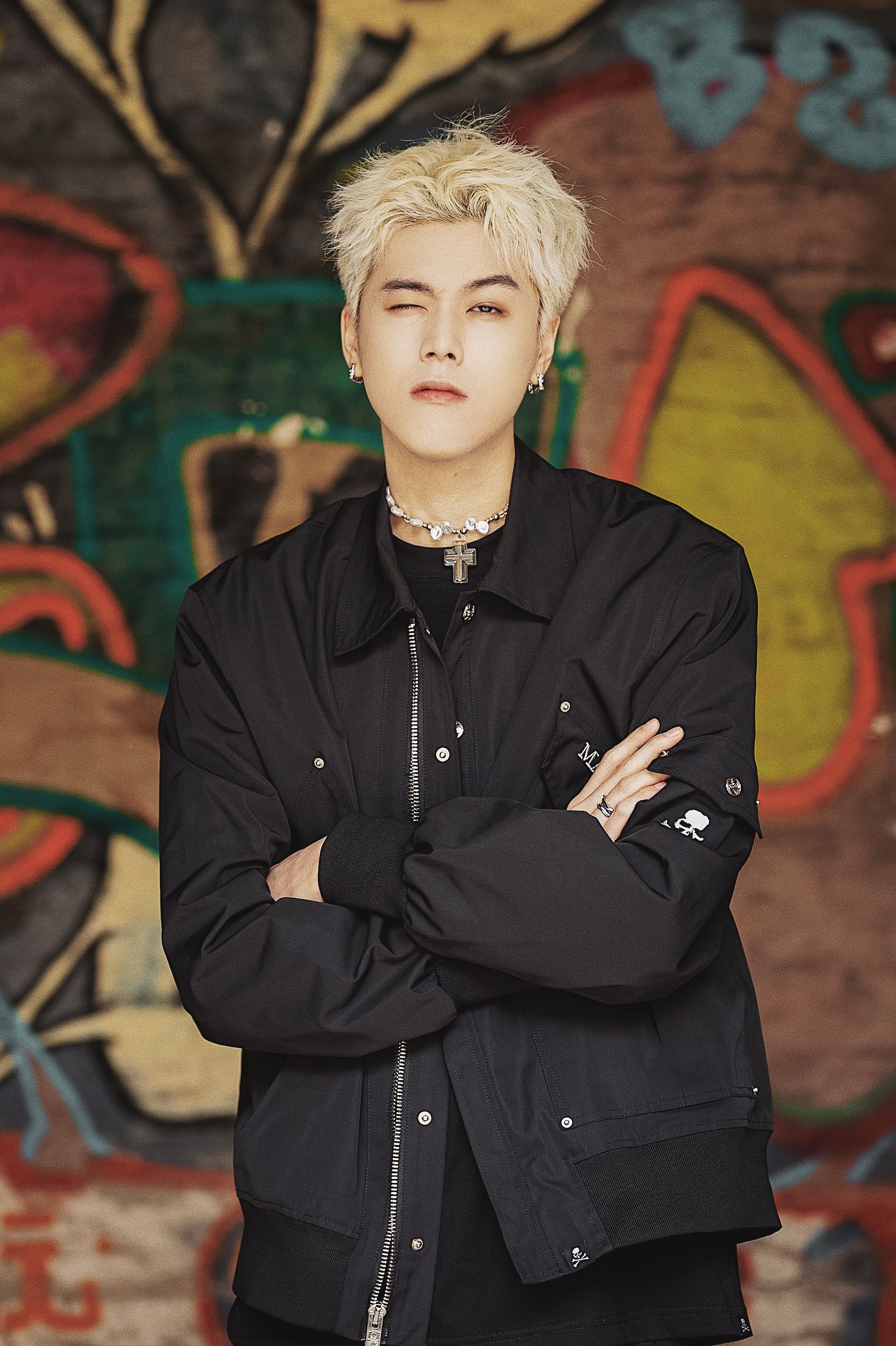 Man in Jacket against Graffiti · Free Stock Photo
