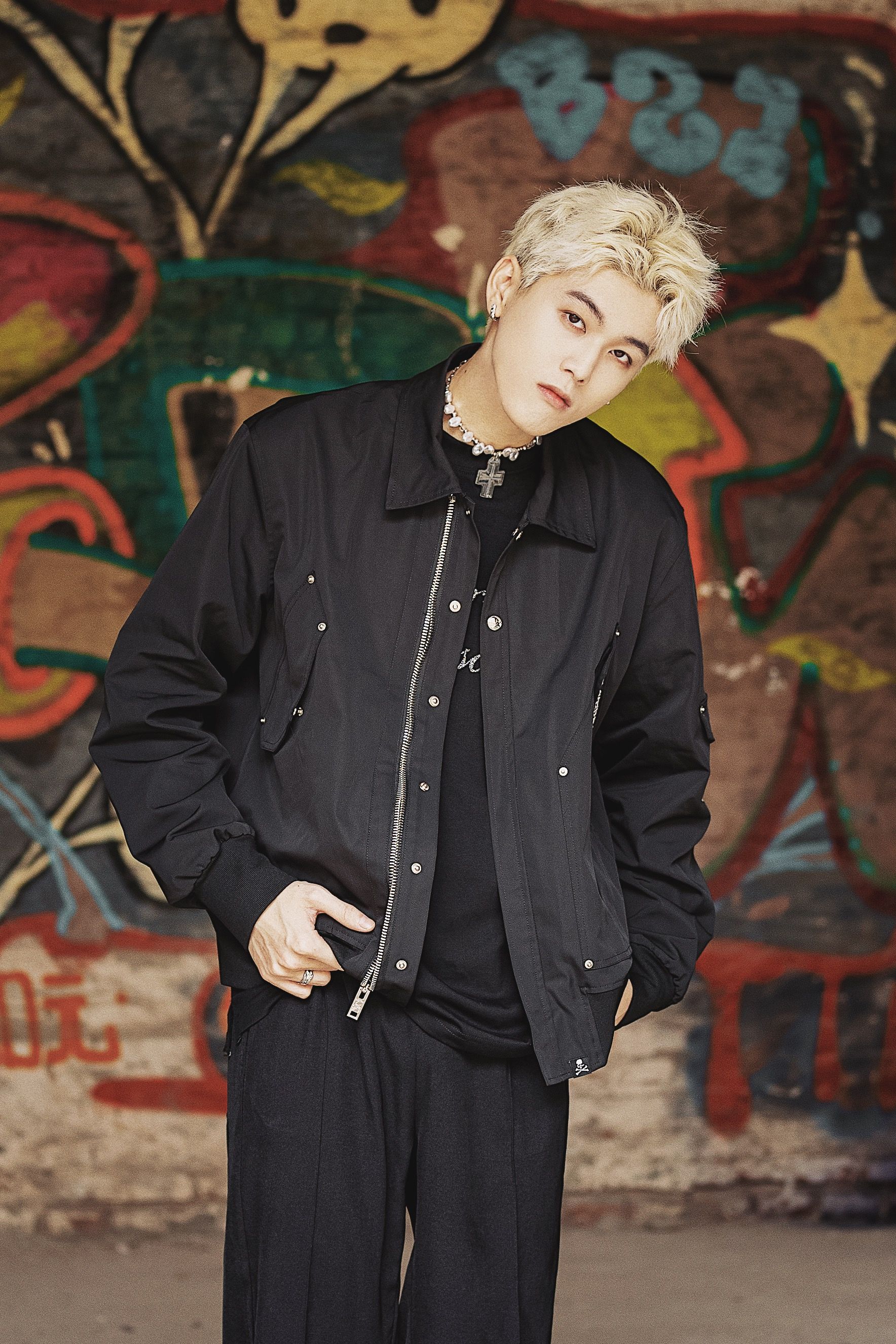 A Fashionable Young Man with Dyed Platinum Blond Hair · Free Stock Photo