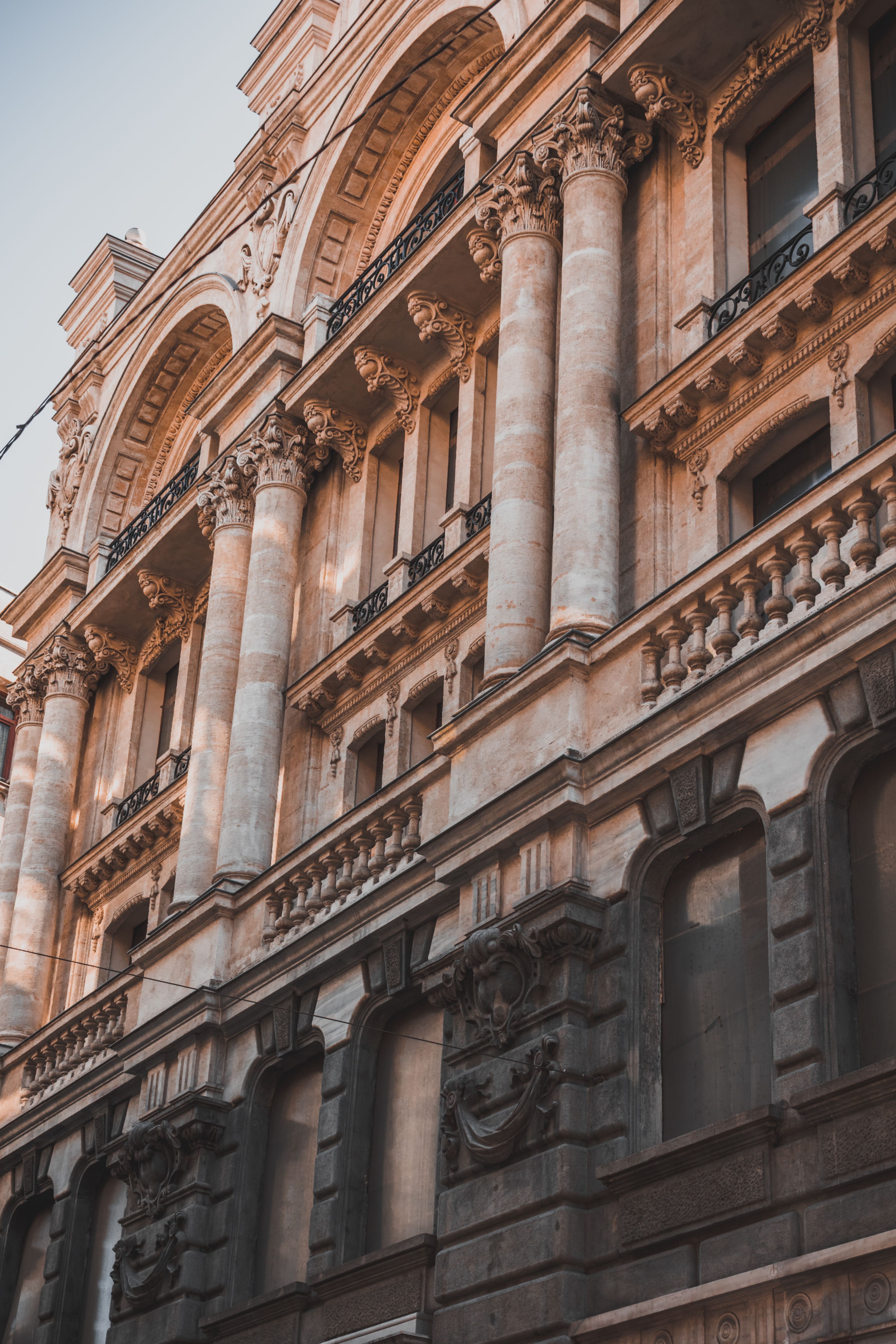 Classicist Building Facade in Perspective · Free Stock Photo
