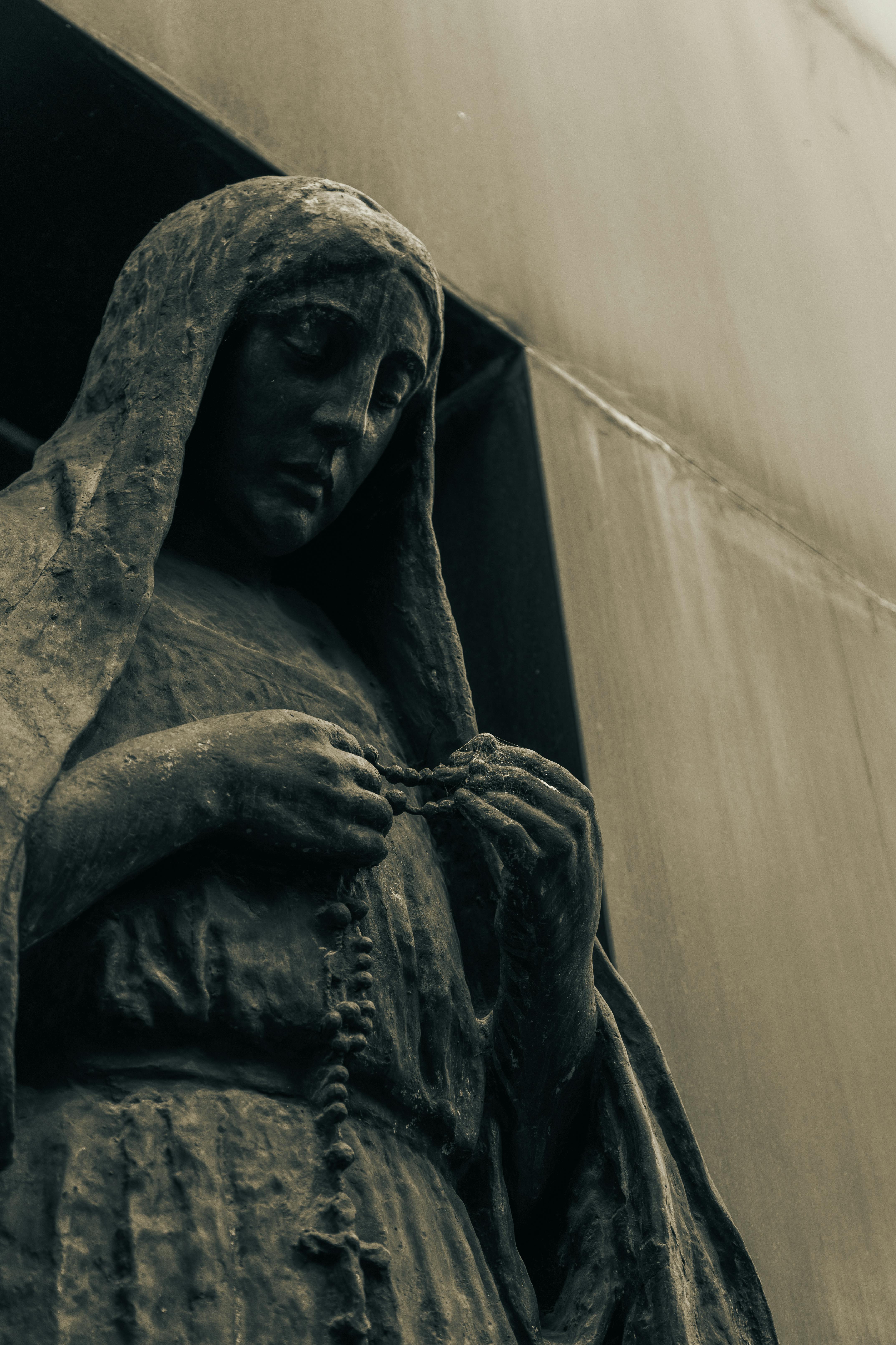 Low Angle Shot of a Virgin Mary Statue · Free Stock Photo