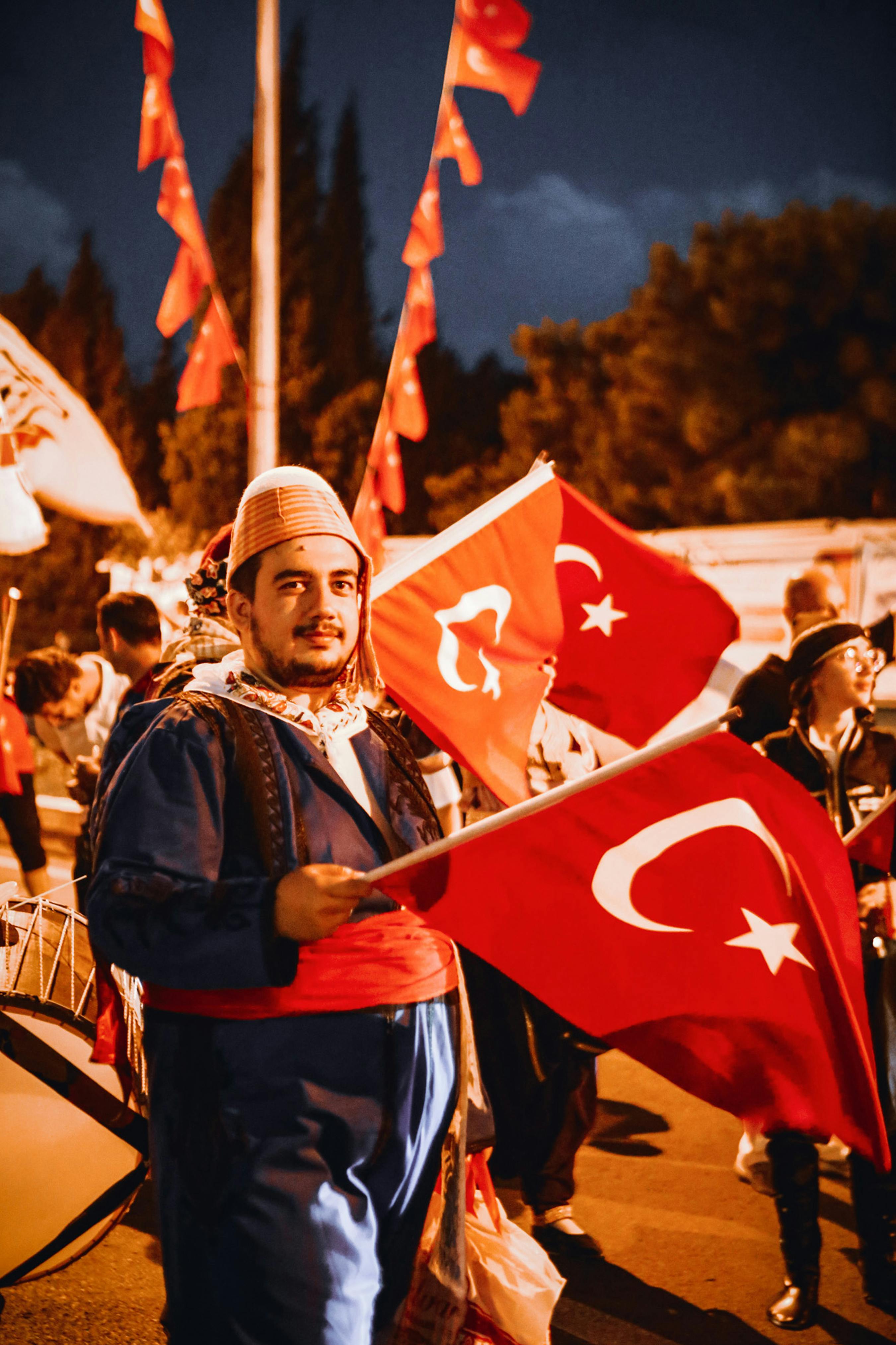 Man with Fez Hat Holding Turkish Flag in Hand · Free Stock Photo