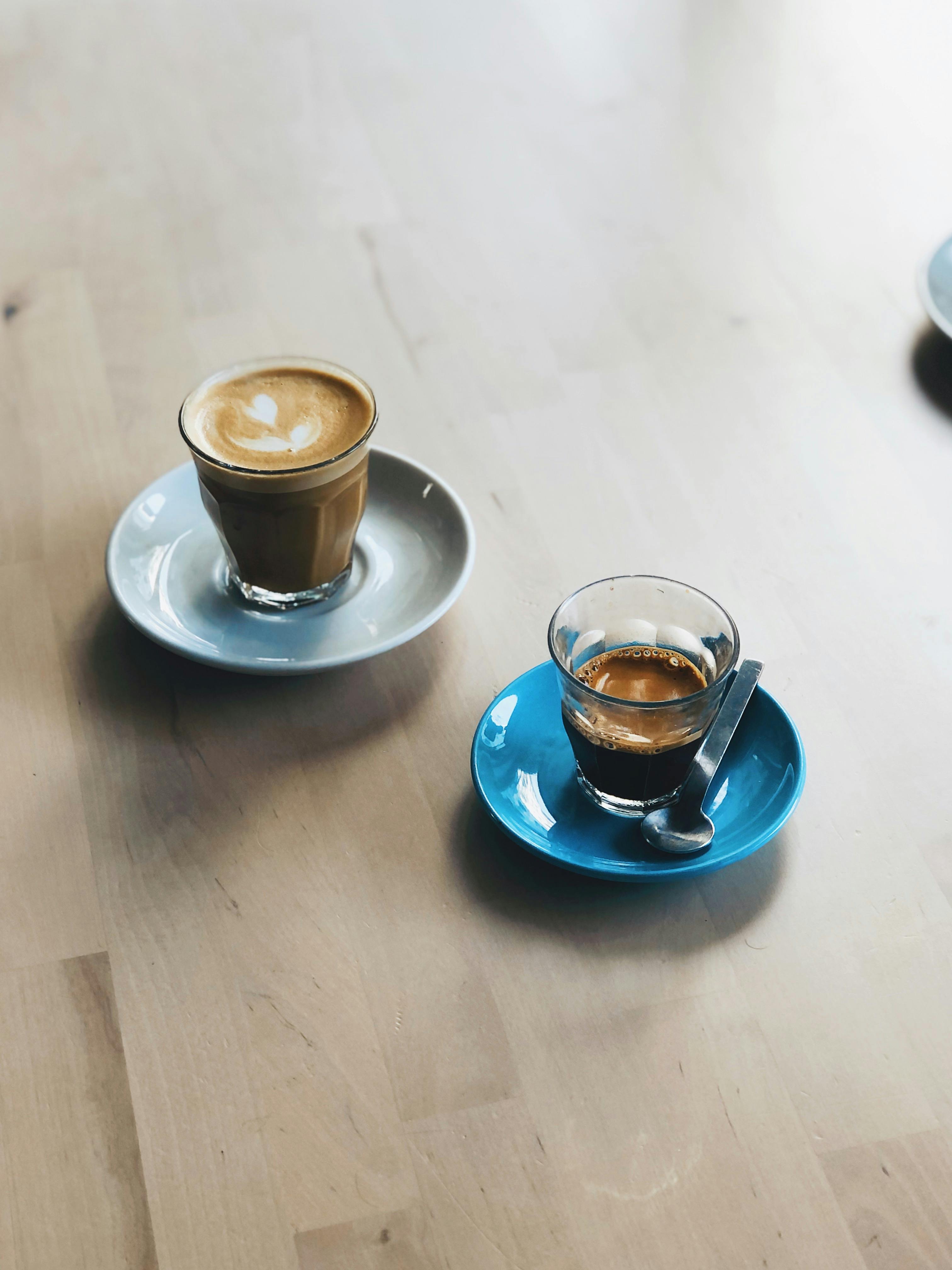 Light Bulb behind Coffee Glass · Free Stock Photo