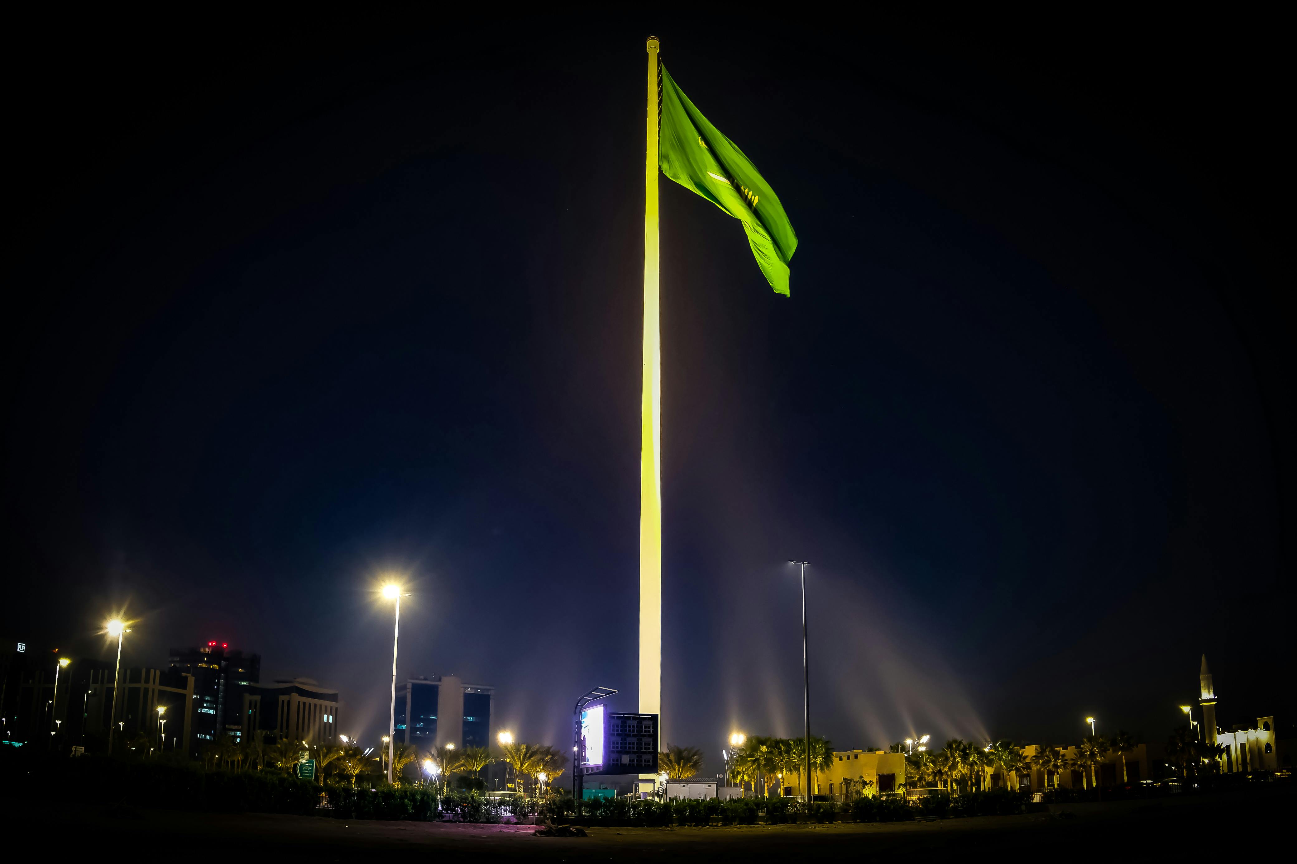 Saudi Flag in City at Night · Free Stock Photo