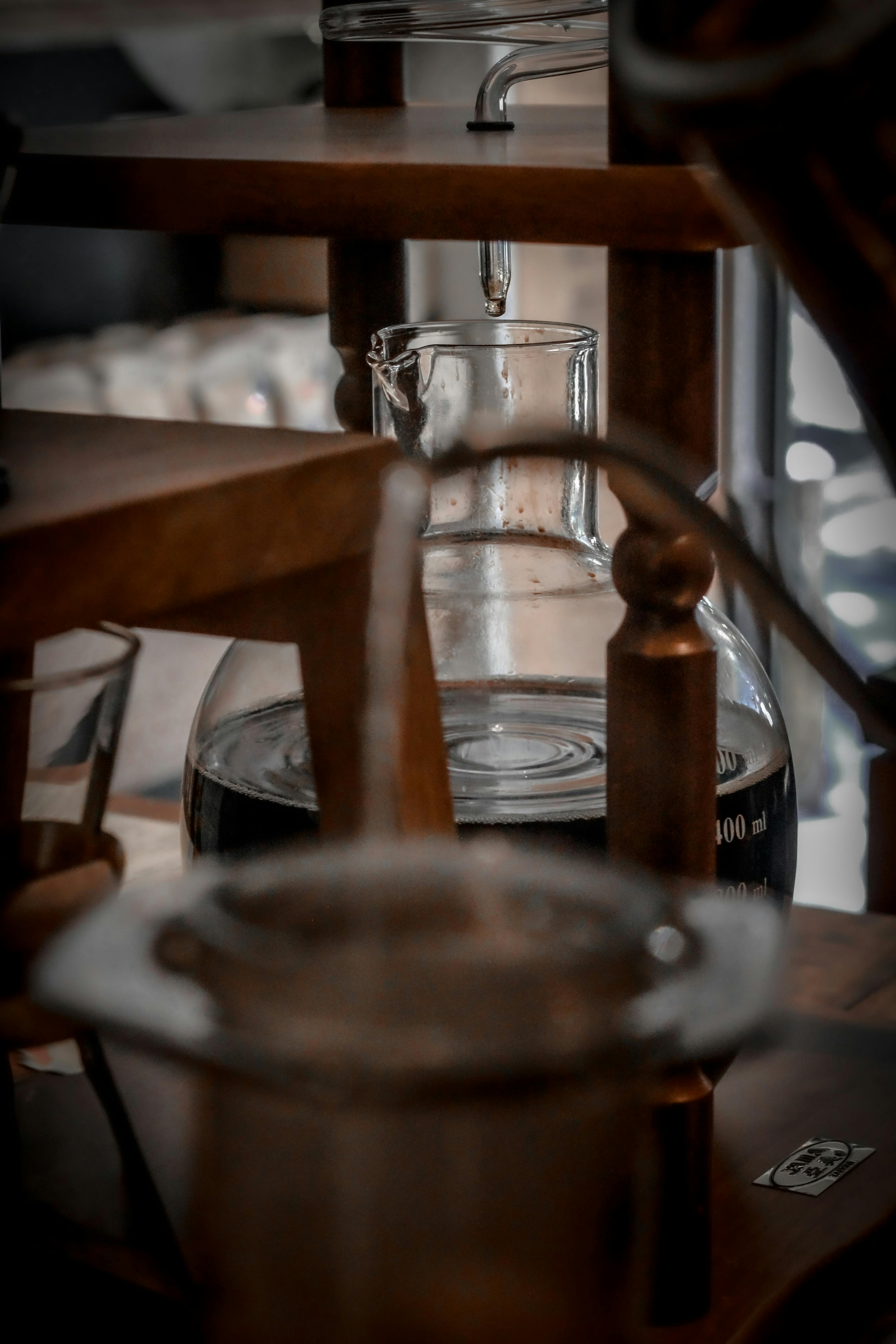 Pouring Liquid to Container · Free Stock Photo