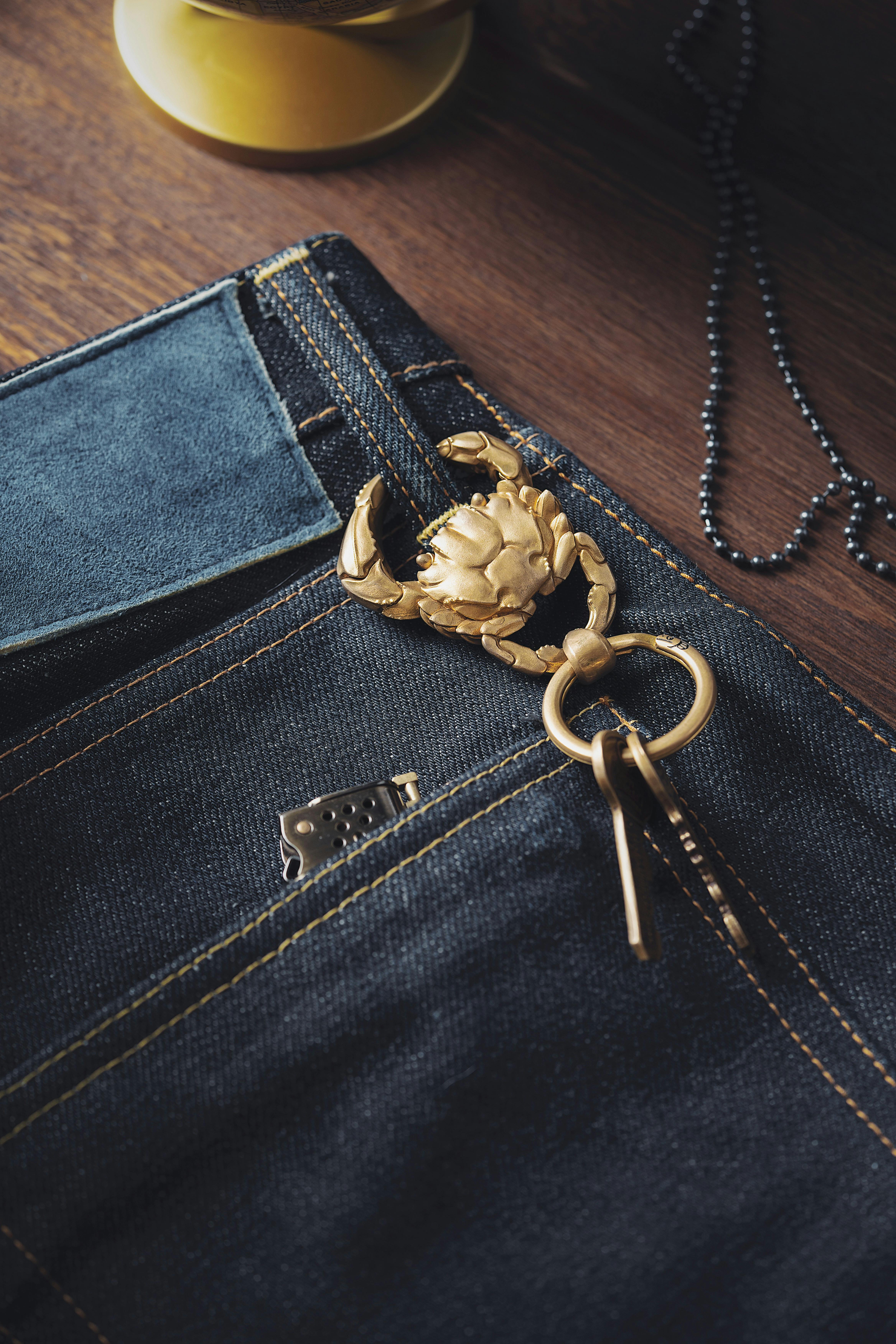 Crab Keychain on Jeans · Free Stock Photo
