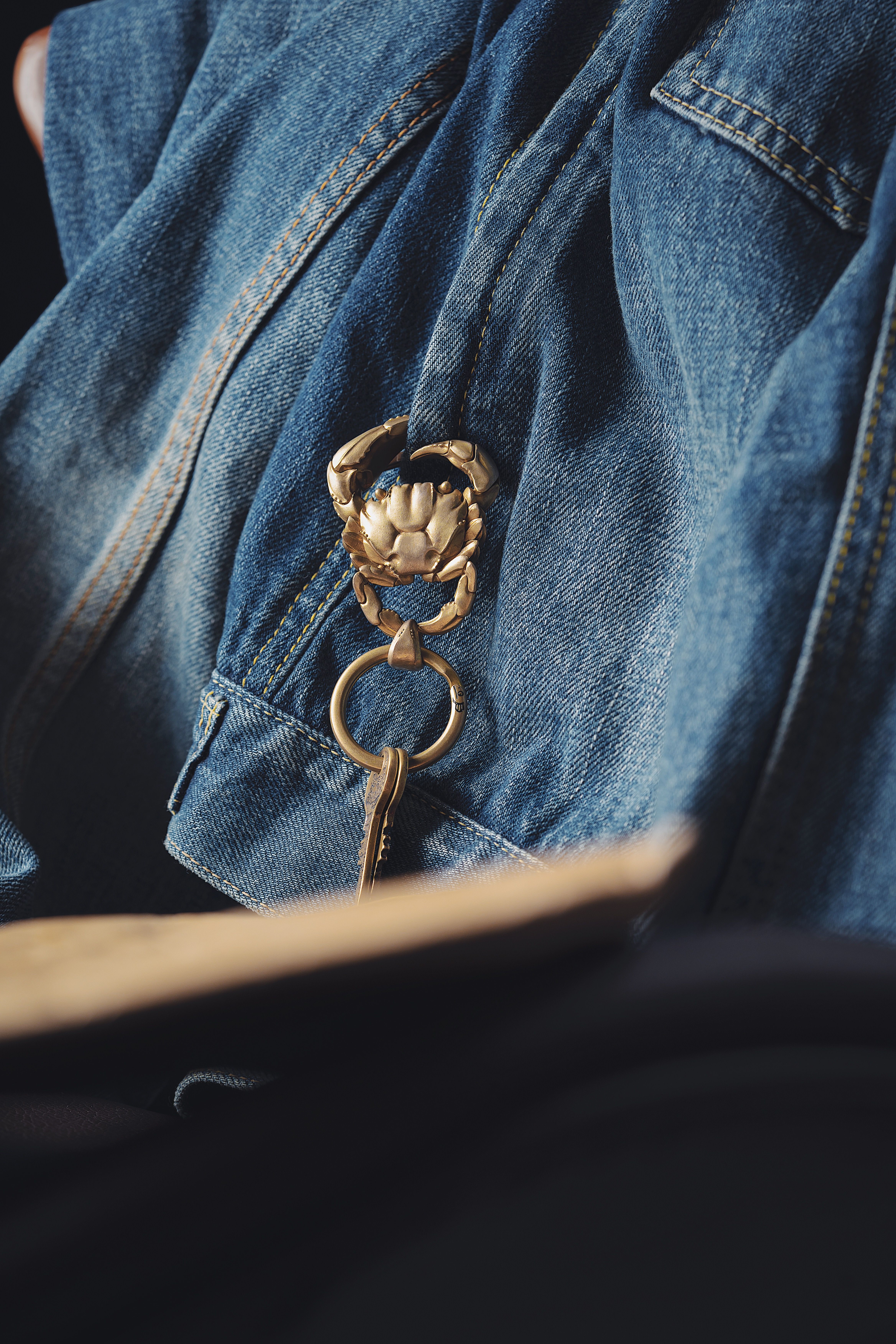 Golden Key Ring on Denim Jacket · Free Stock Photo