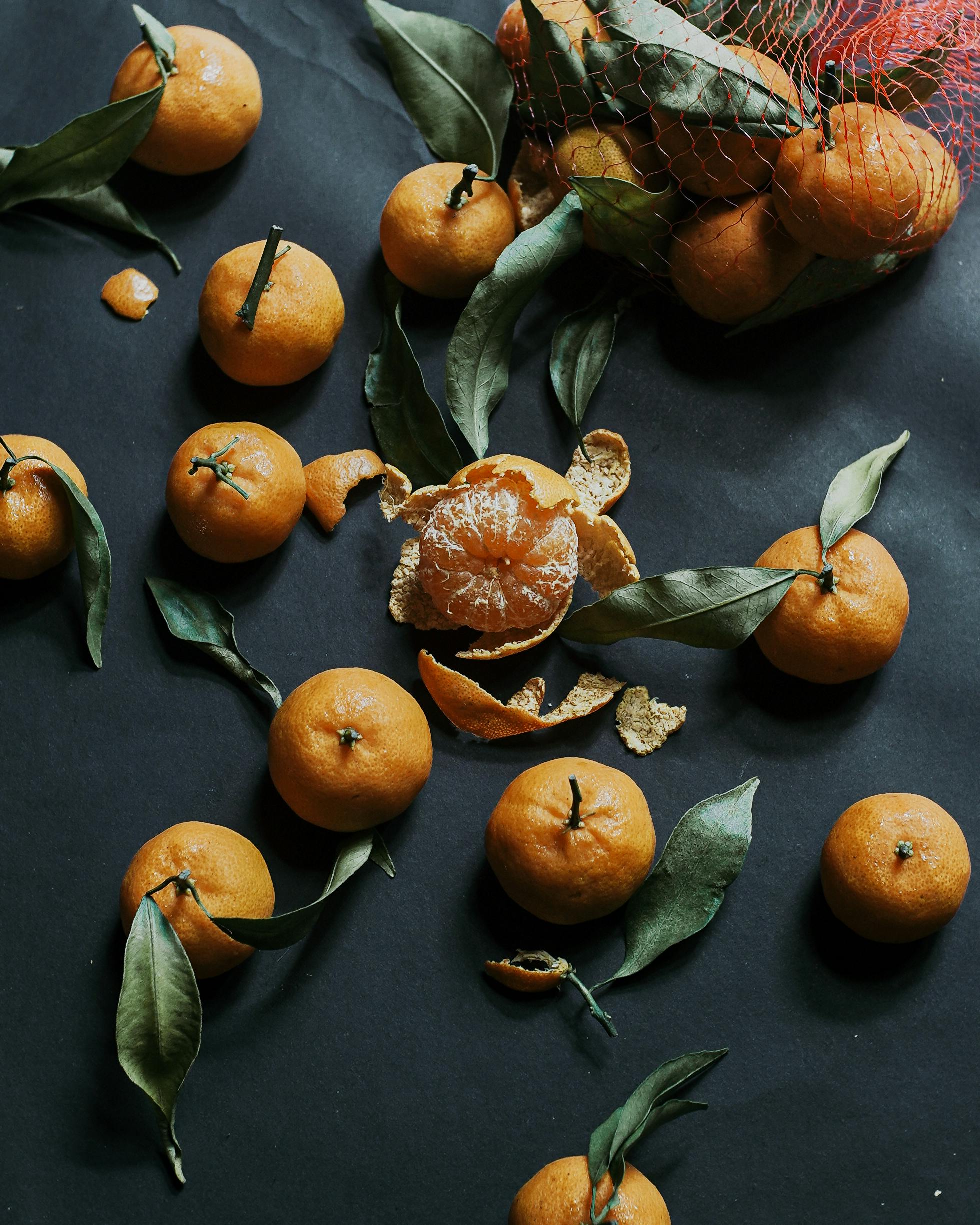 Mandarin Surrounded by Pumpkins · Free Stock Photo
