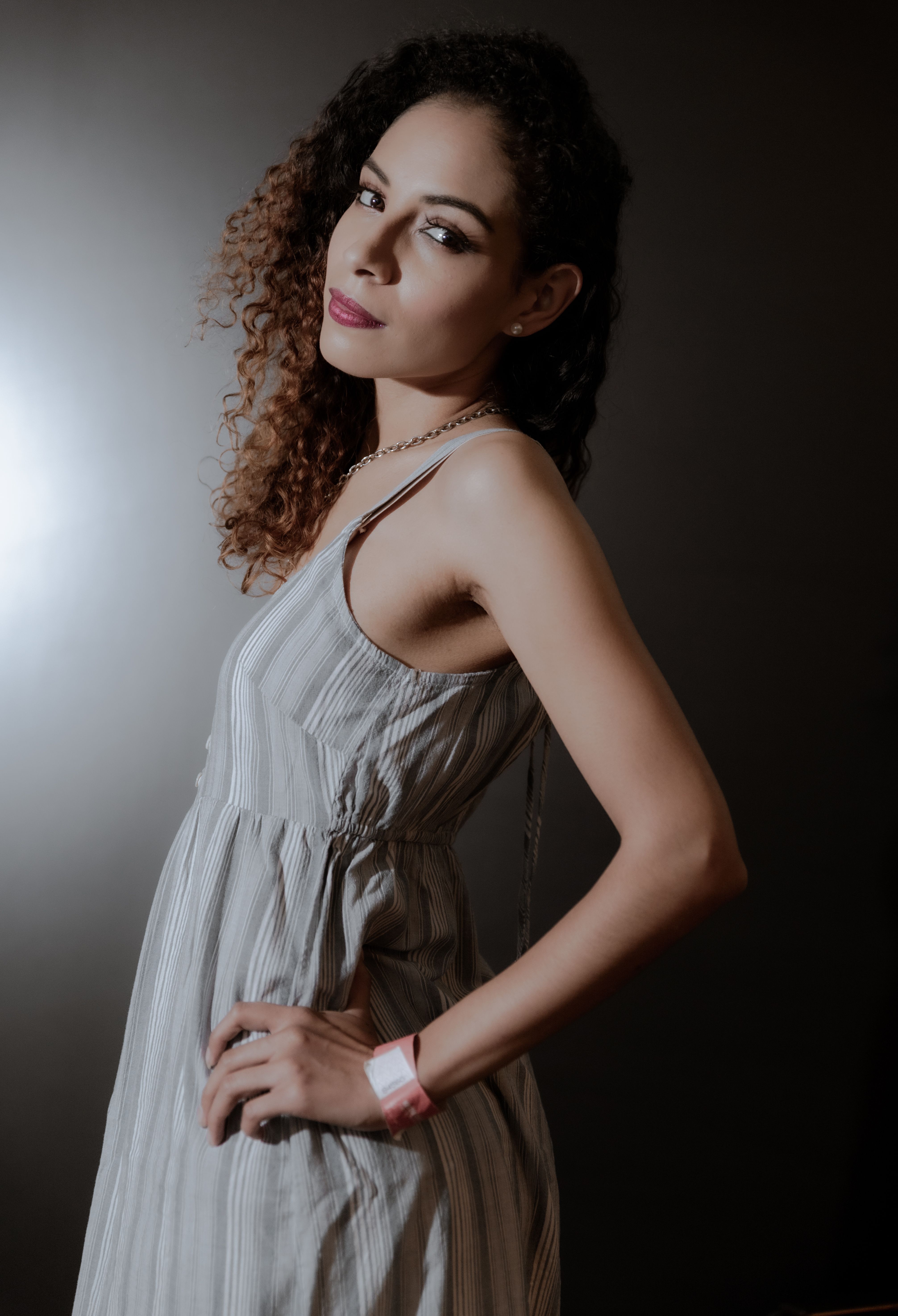 Woman Posing with Hands inside Pockets · Free Stock Photo