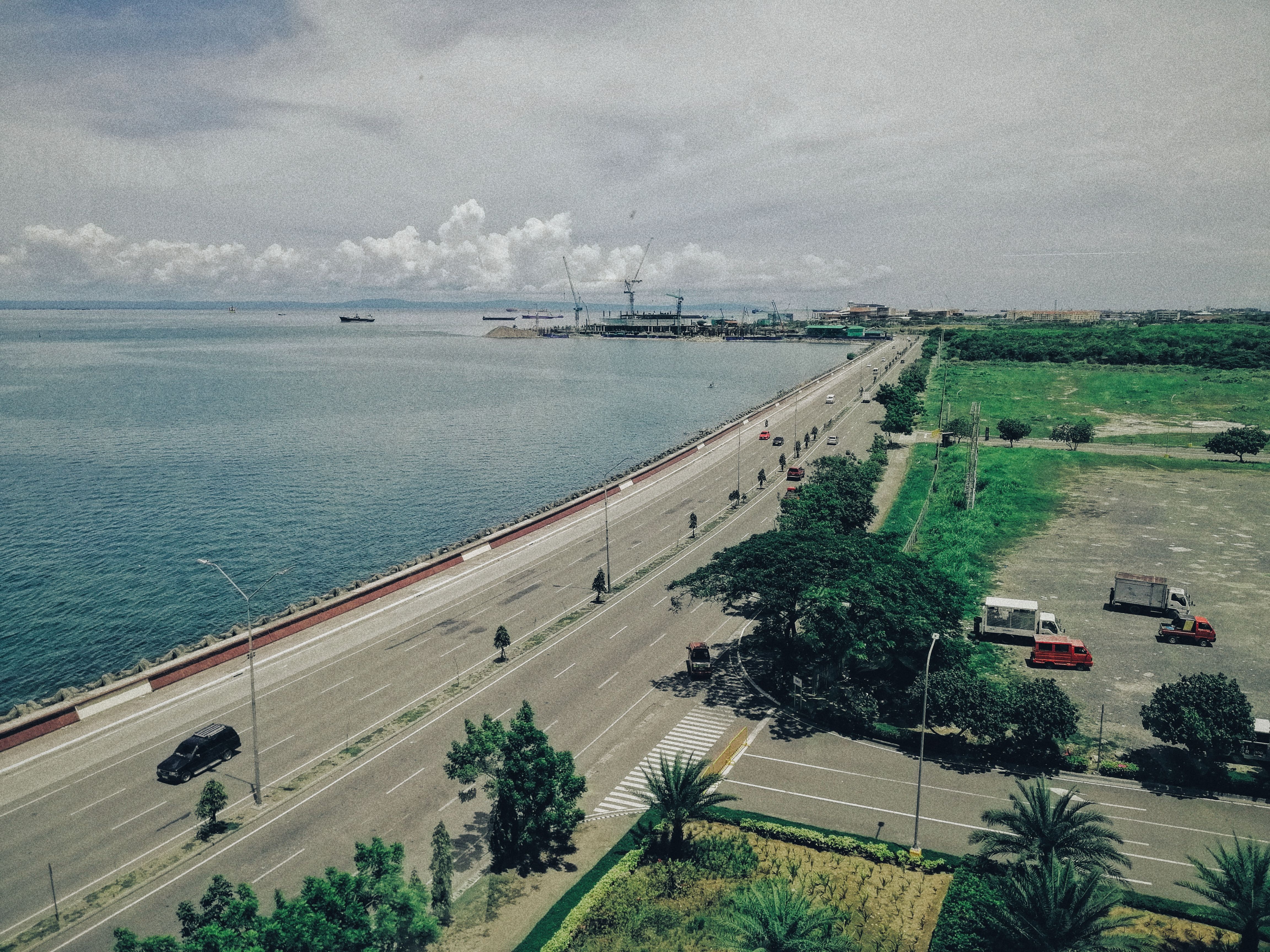 Aerial View of Highway Running along Sea Shore · Free Stock Photo