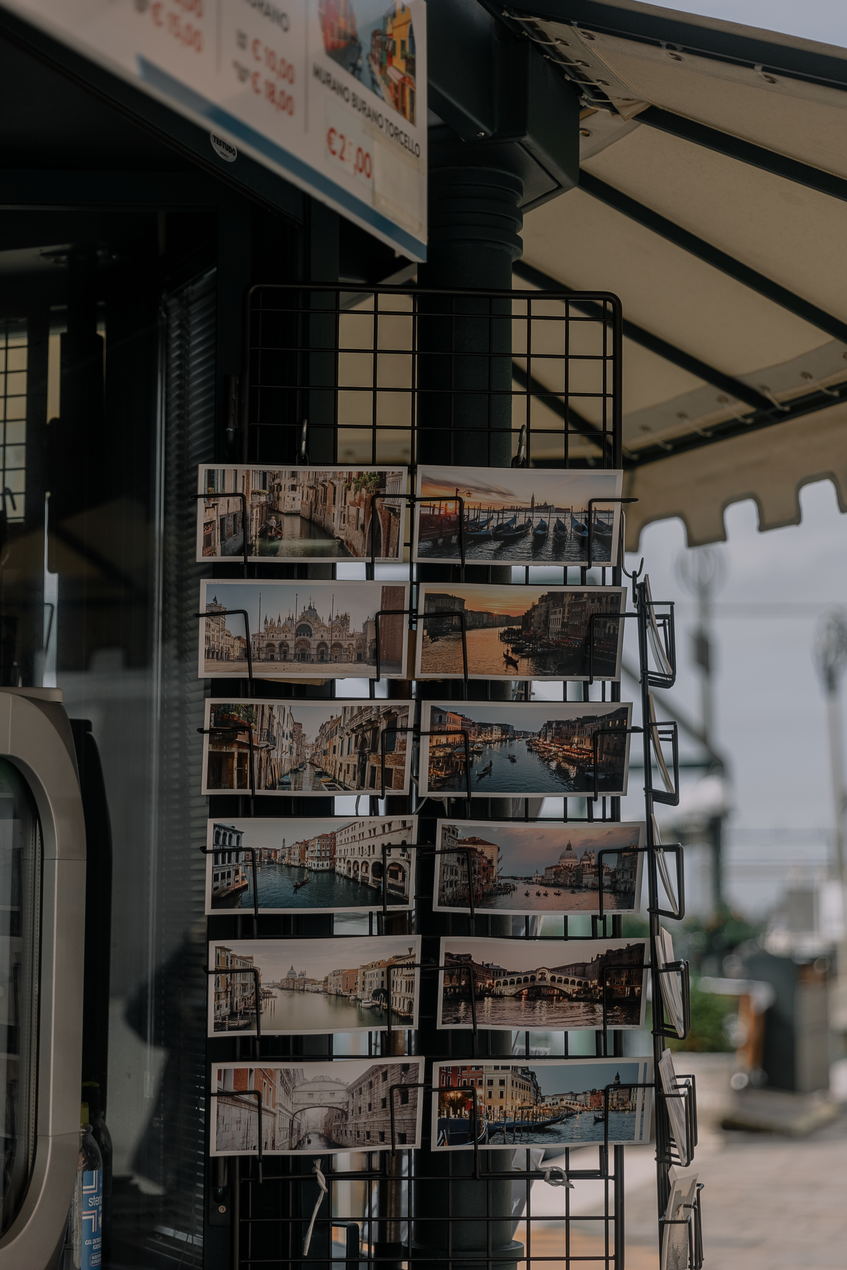 Postcards on a Stand in a Souvenir Shop · Free Stock Photo